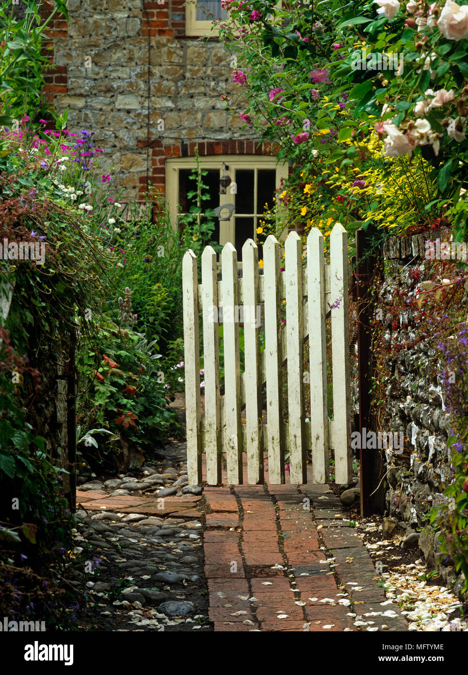 Country cottage garden brick path hi-res stock photography and images ...