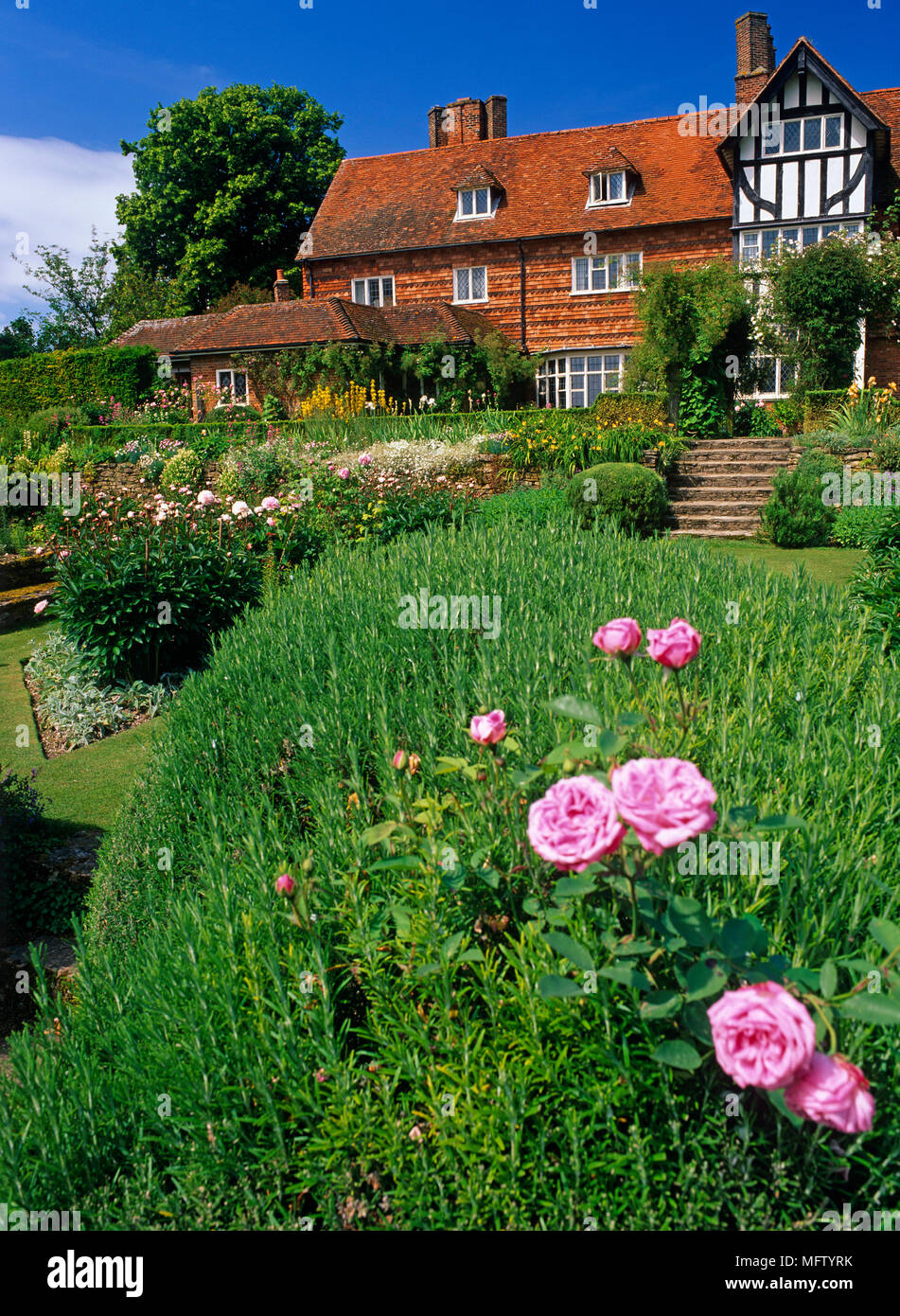 Exterior of country house with terraced garden and dry stone wall Stock ...