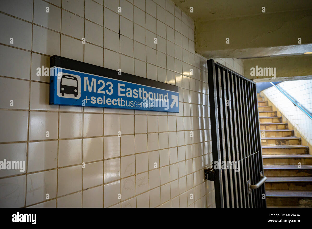 A sign in the subway directing travelers to the Select Bus Service bus ...