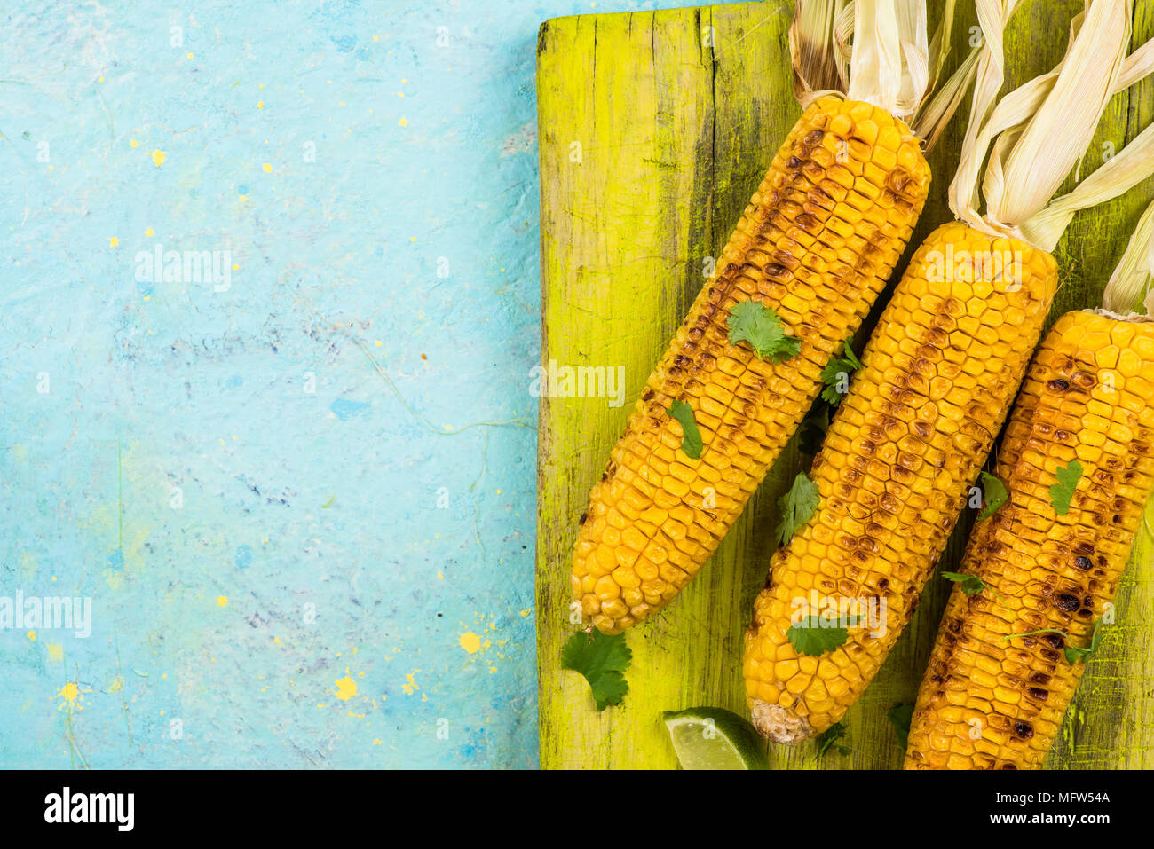 Grilled corn, food border background Stock Photo - Alamy