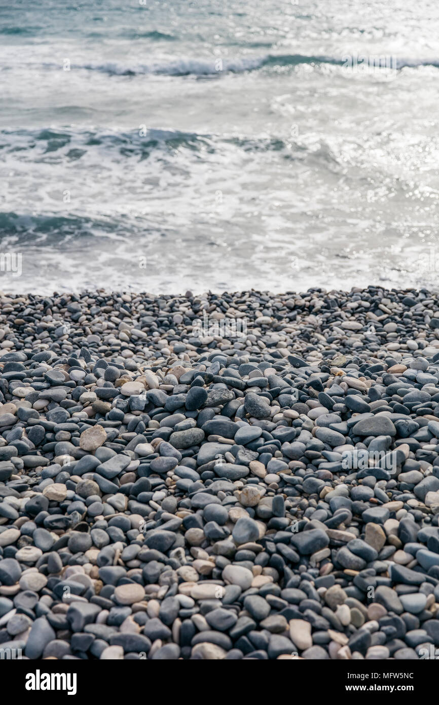Detail of the cobble stone beach and sea Stock Photo - Alamy