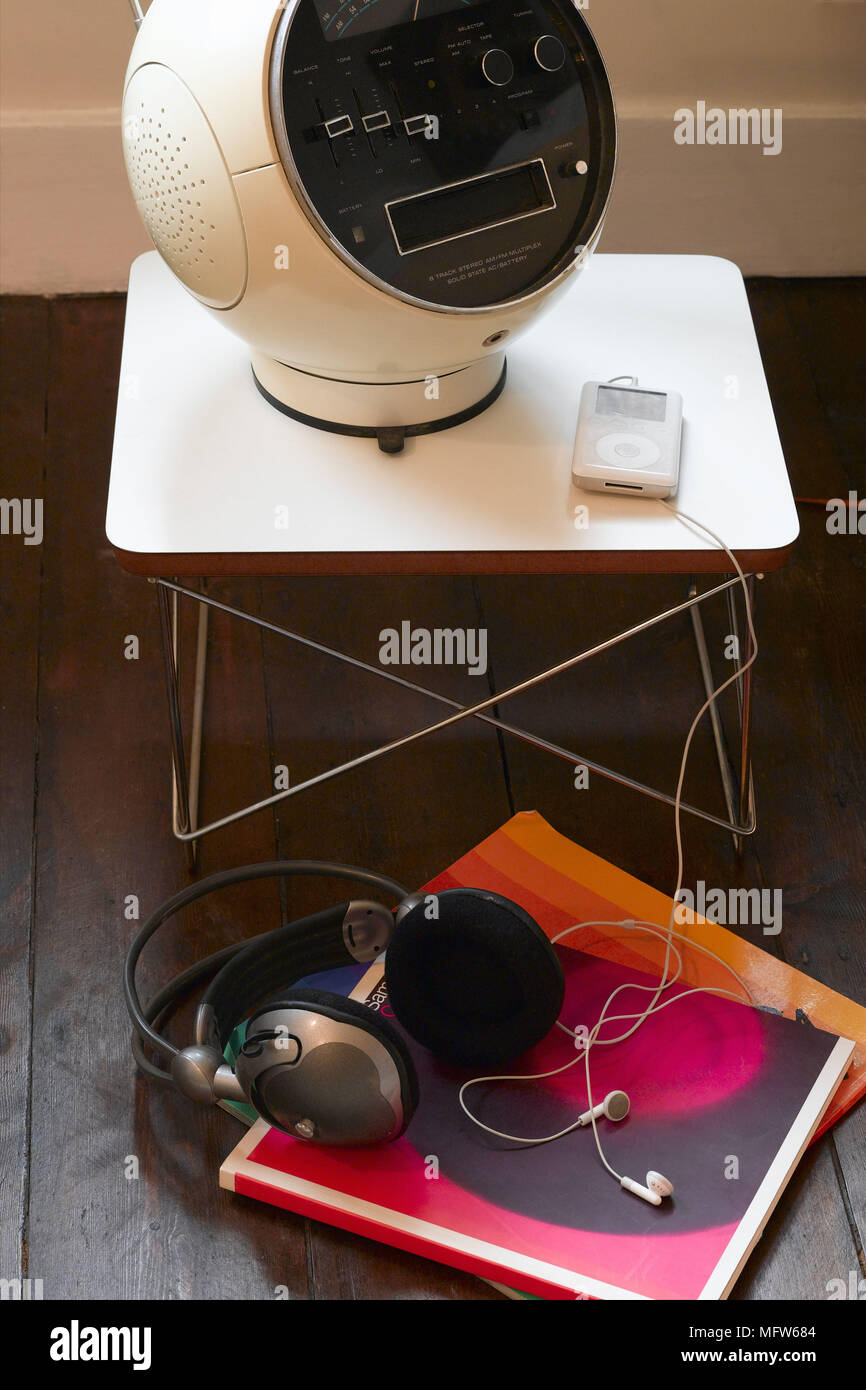 Retro stereo on side table with an mp3 player vinyl records and ...