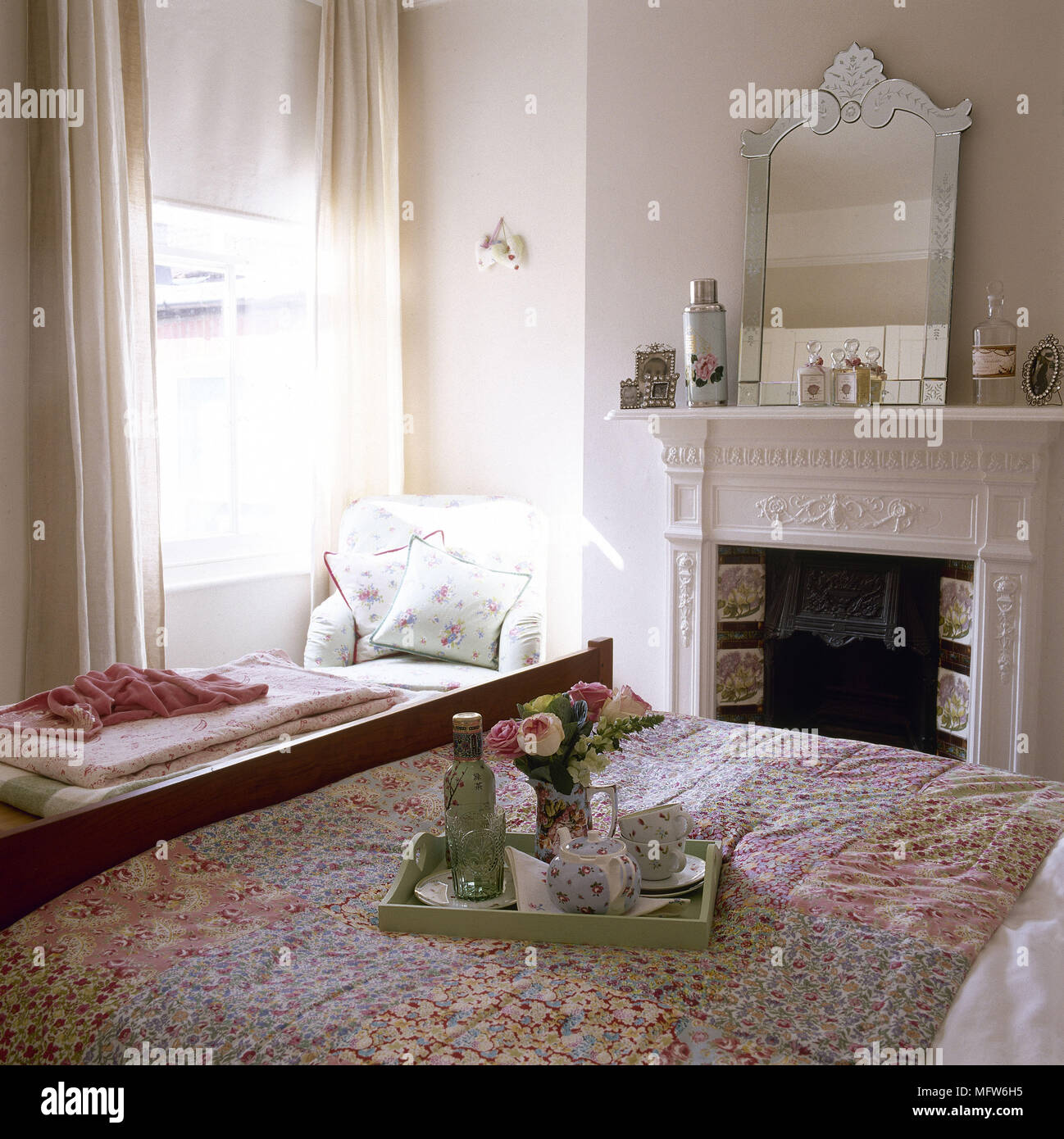 Pink Bedroom With Fireplace