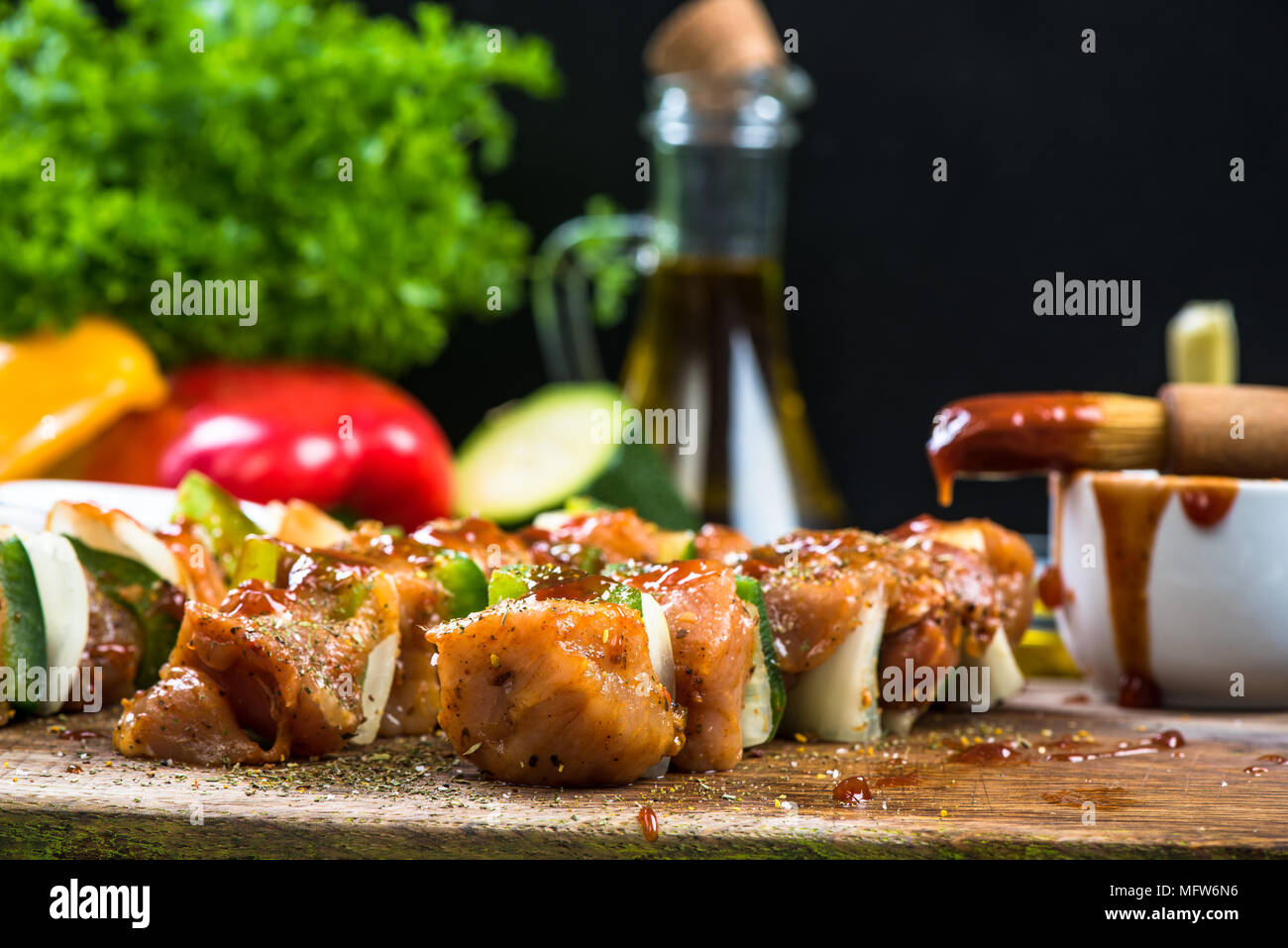 Mixed skewers with spieces and glaze Stock Photo - Alamy