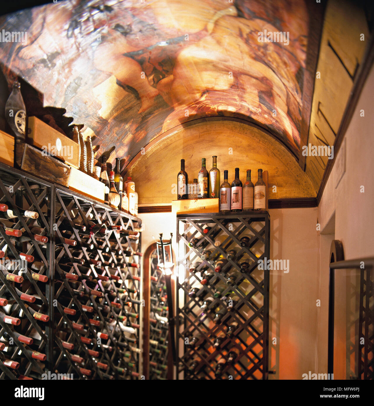 Wine cellar detail with painted mural on arched ceiling Stock Photo - Alamy