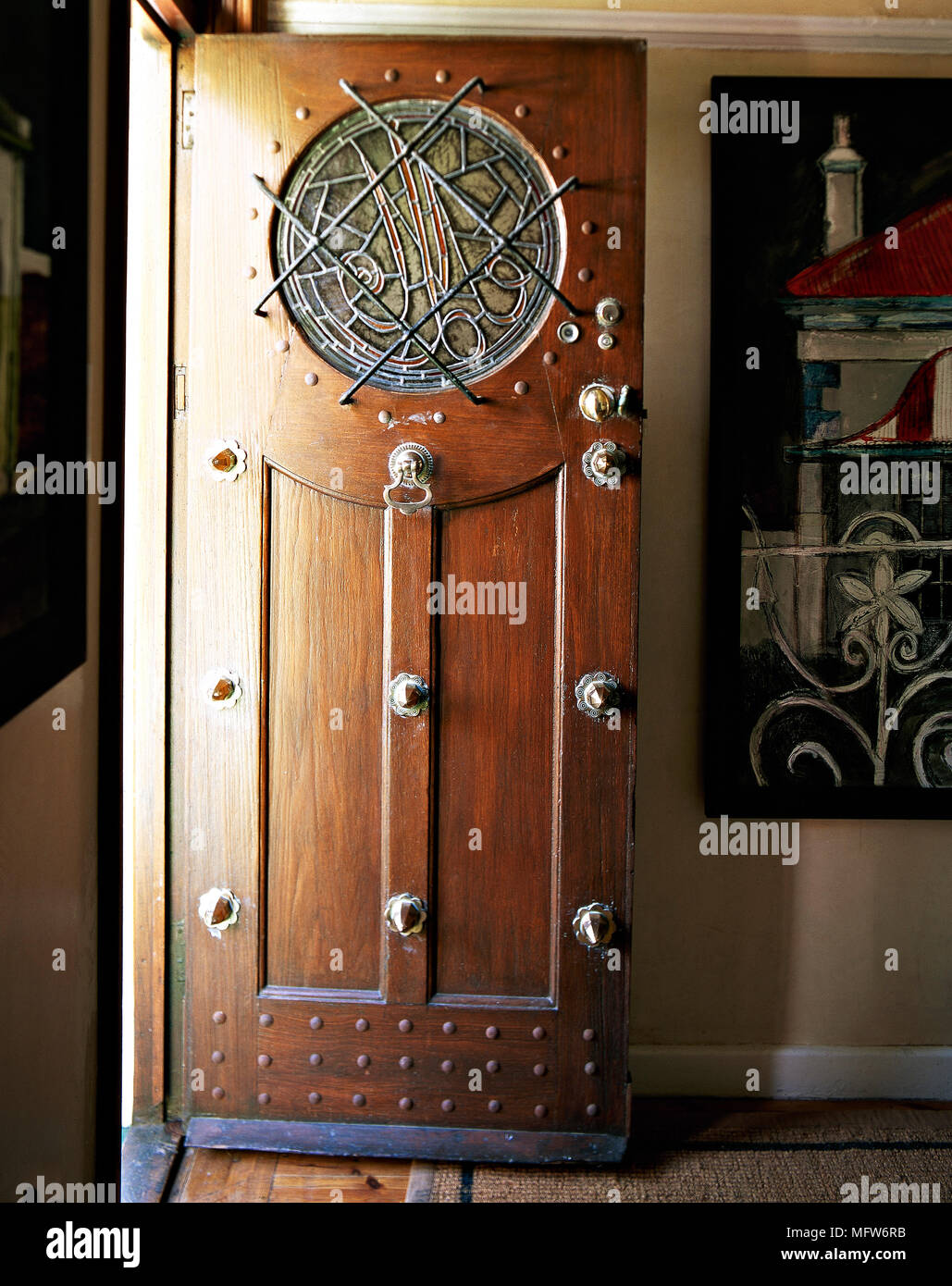Entryway view of open, rustic wood door Stock Photo - Alamy