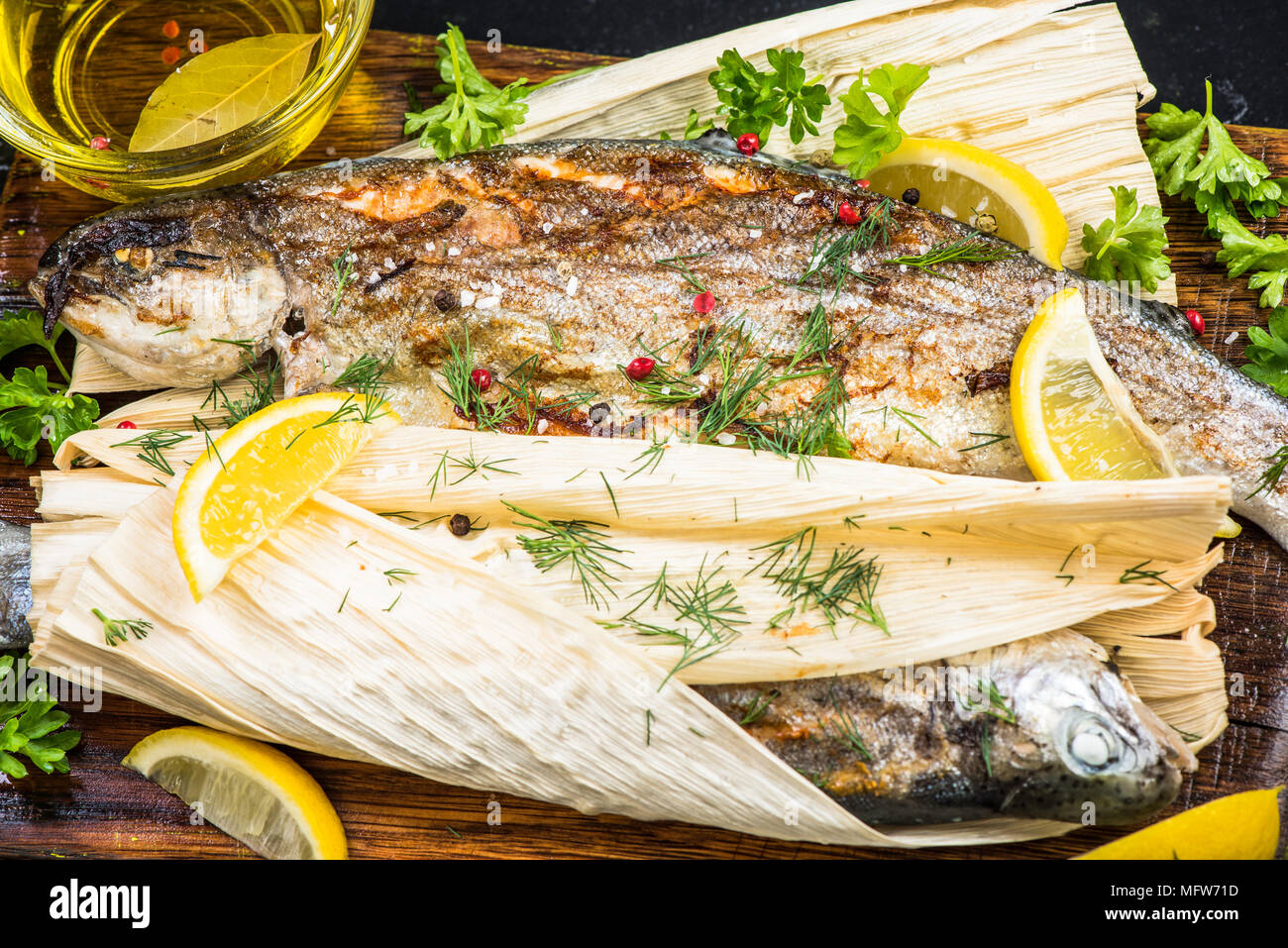 Healthy dish, grilled fish with herbs Stock Photo - Alamy