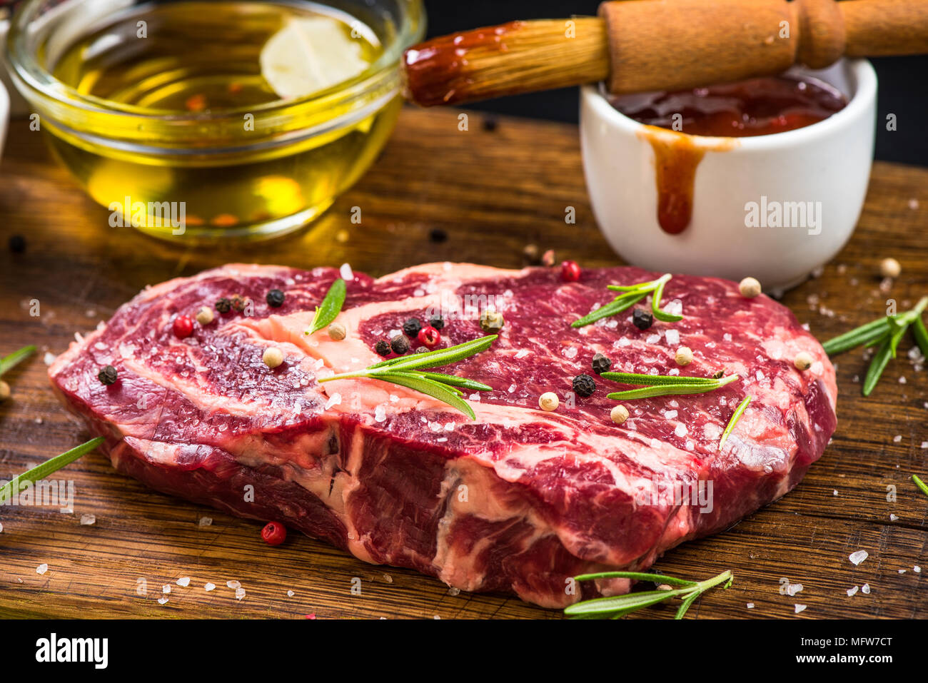 BBQ beef raw meat with glaze and spices Stock Photo - Alamy