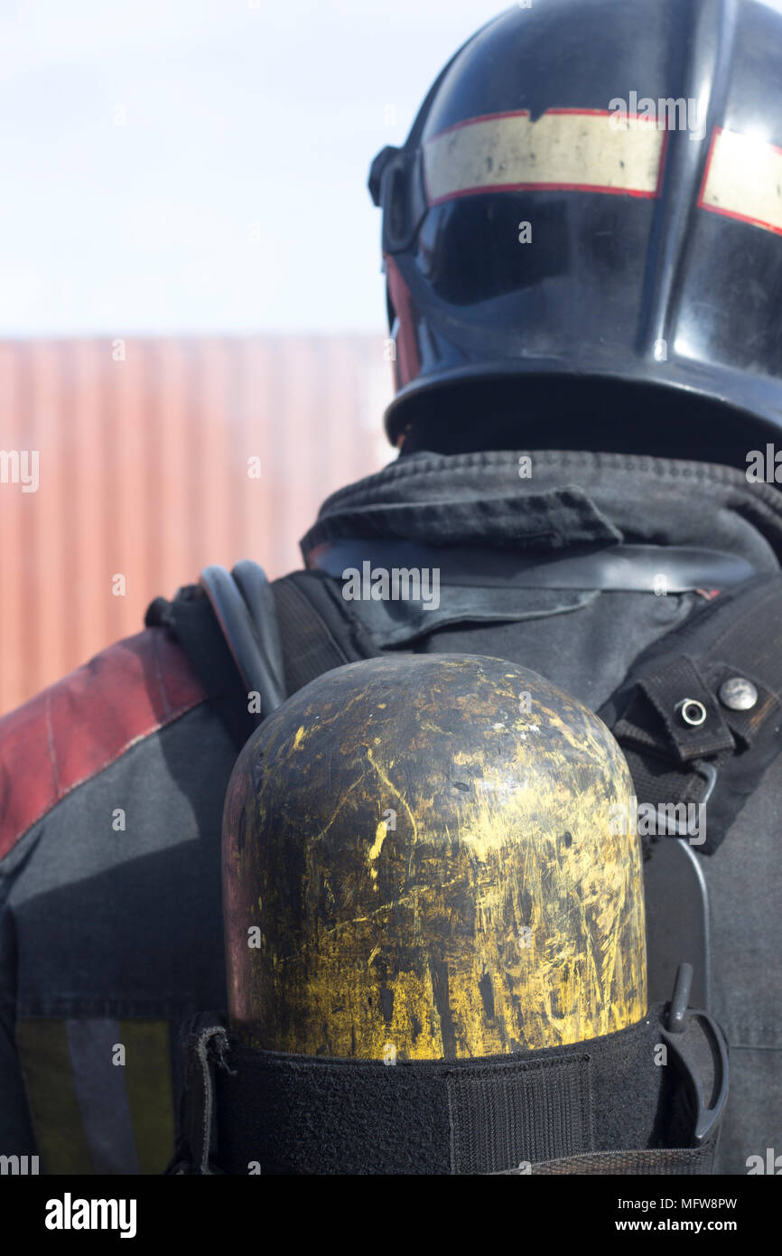 Firefighter putting out fire training station extinguisher backdraft ...