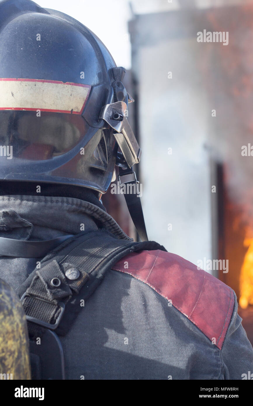Firefighter putting out fire training station extinguisher backdraft ...