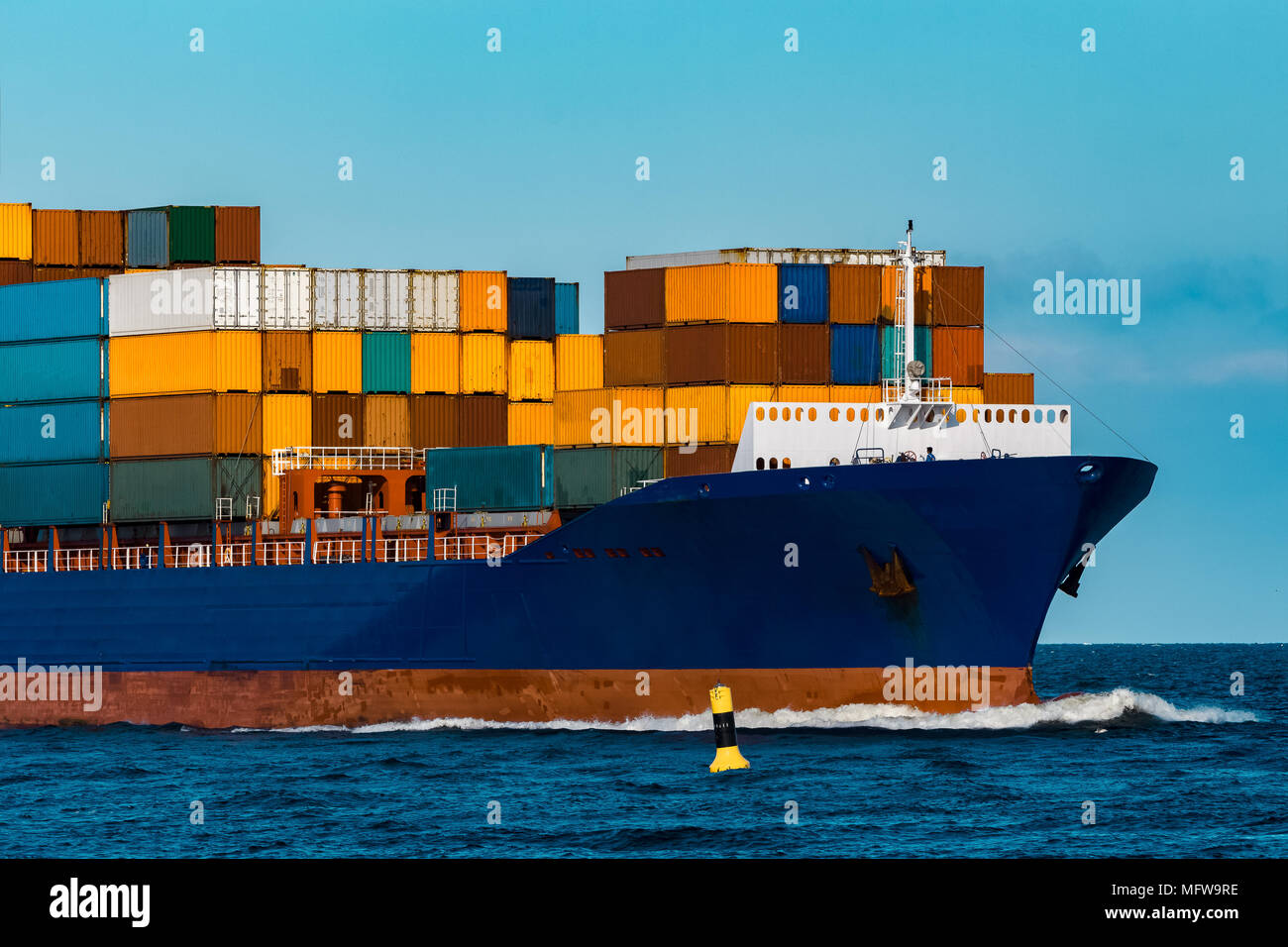Blue container ship in travel. Logistics and freight industry Stock ...