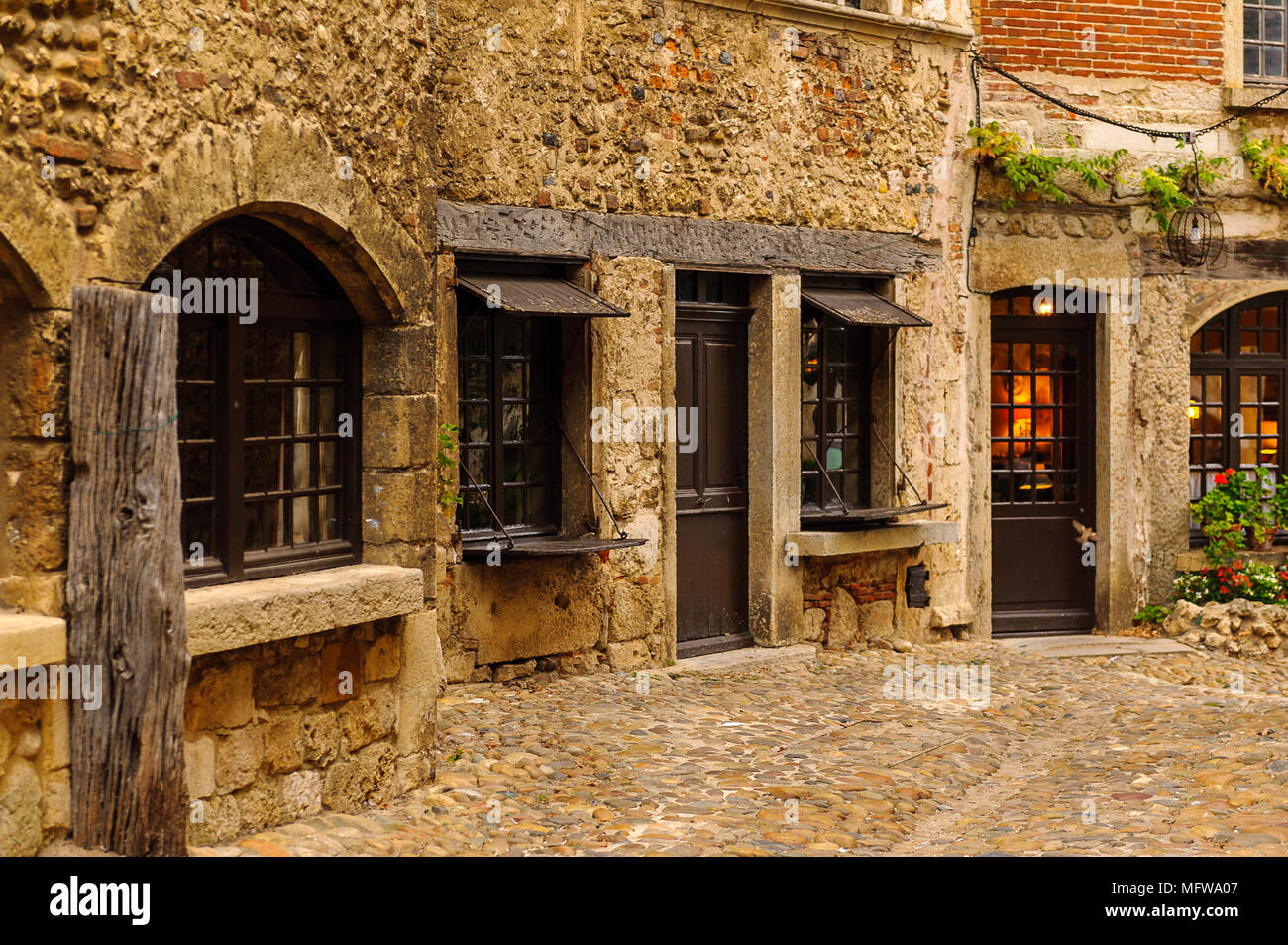 Stone house of Perouges, France, a medieval walled town, a popular ...