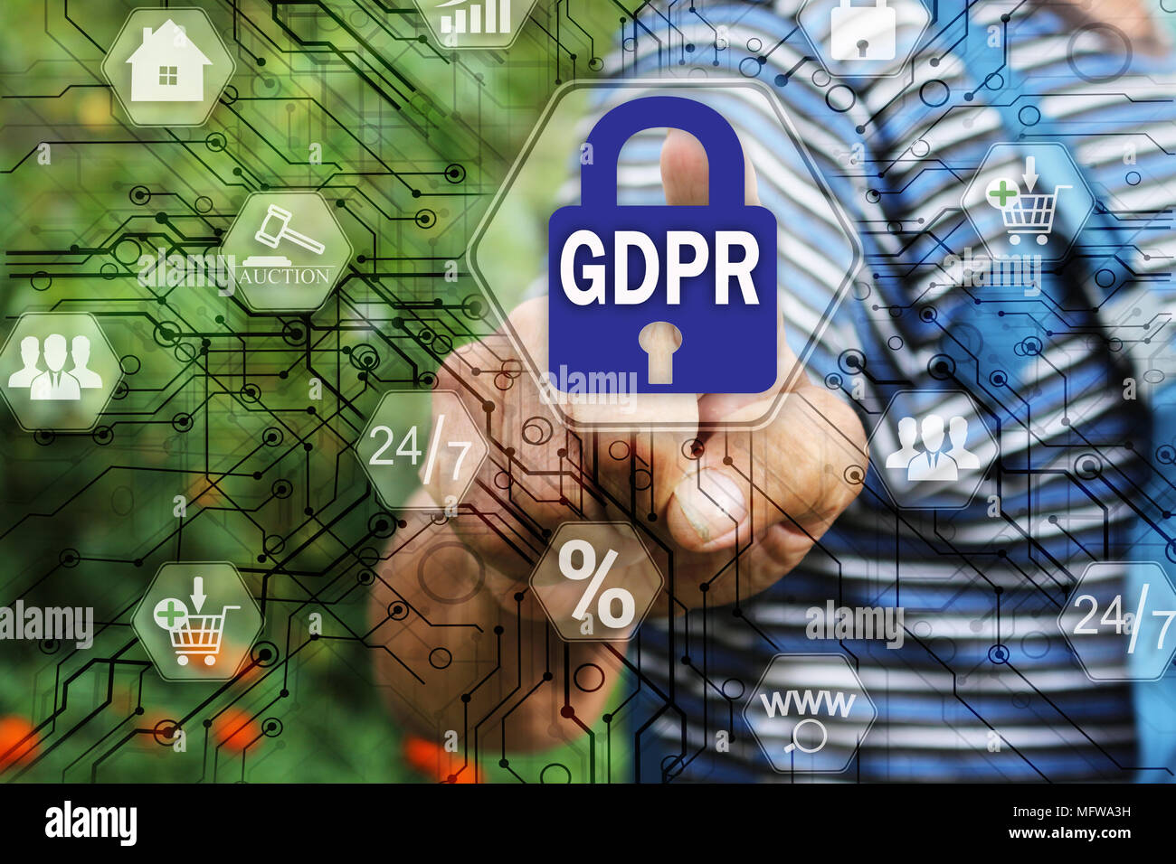 Elderly businessman, the farmer chooses the GDPR on the touch screen ...