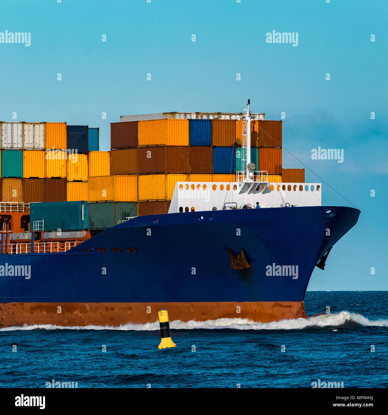 Blue container ship in travel. Logistics and freight industry Stock ...