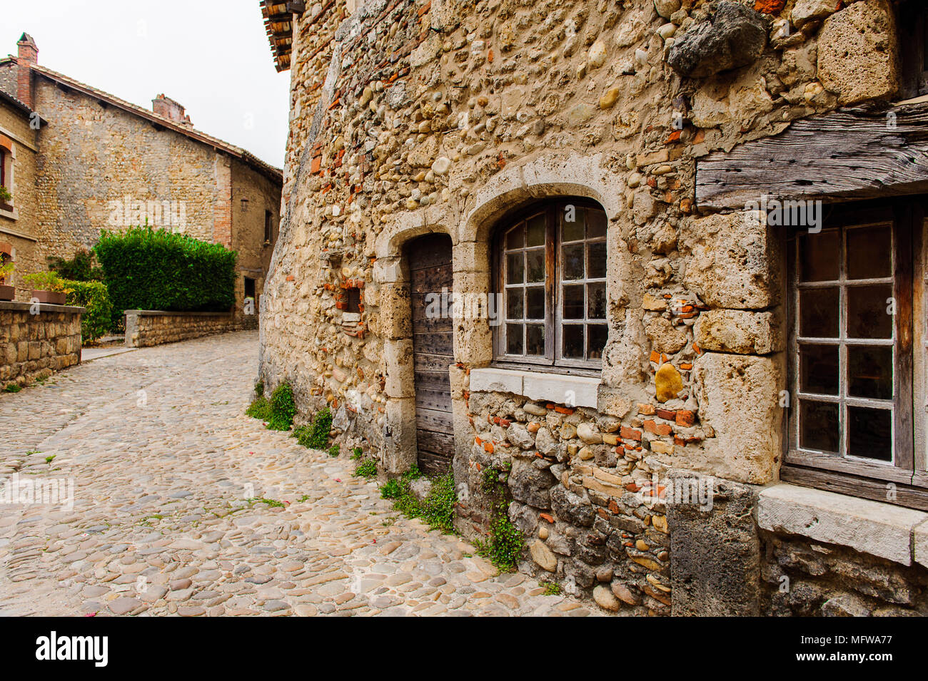 Street of Perouges, France, a medieval walled town, a popular touristic ...