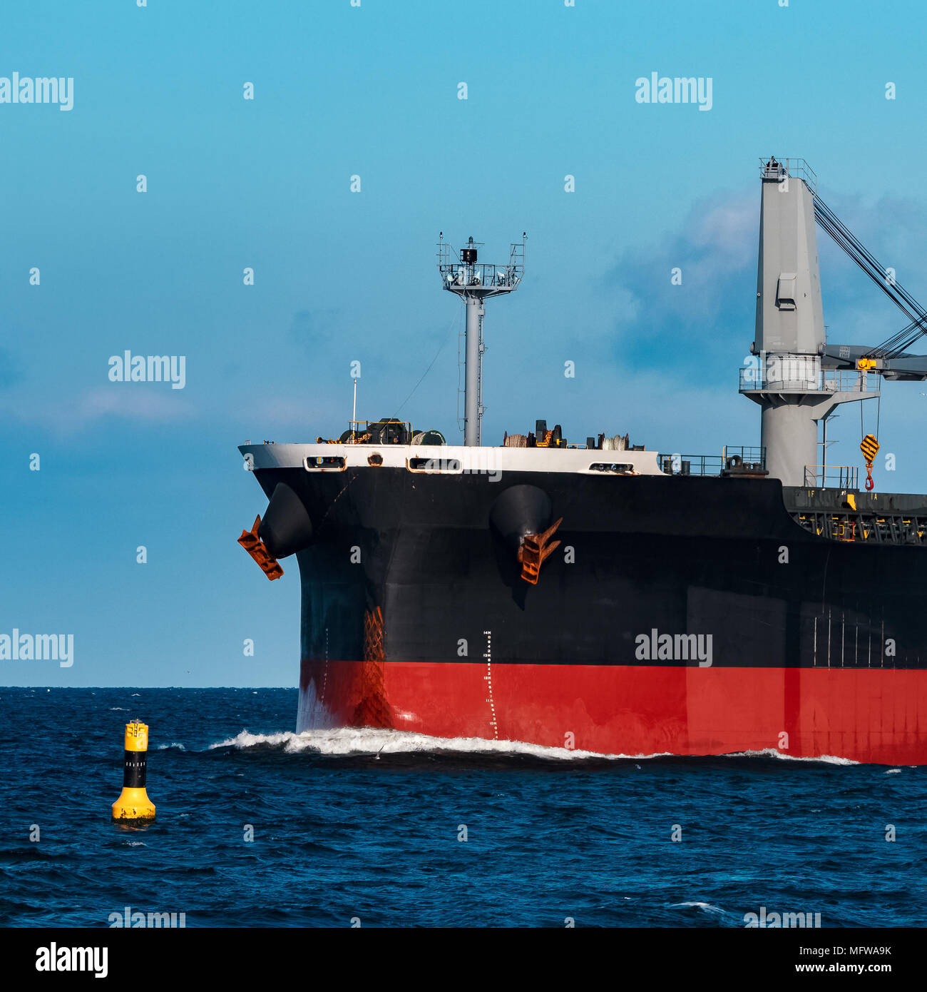 Black bulker ship. Logistics and merchandise transportations Stock ...