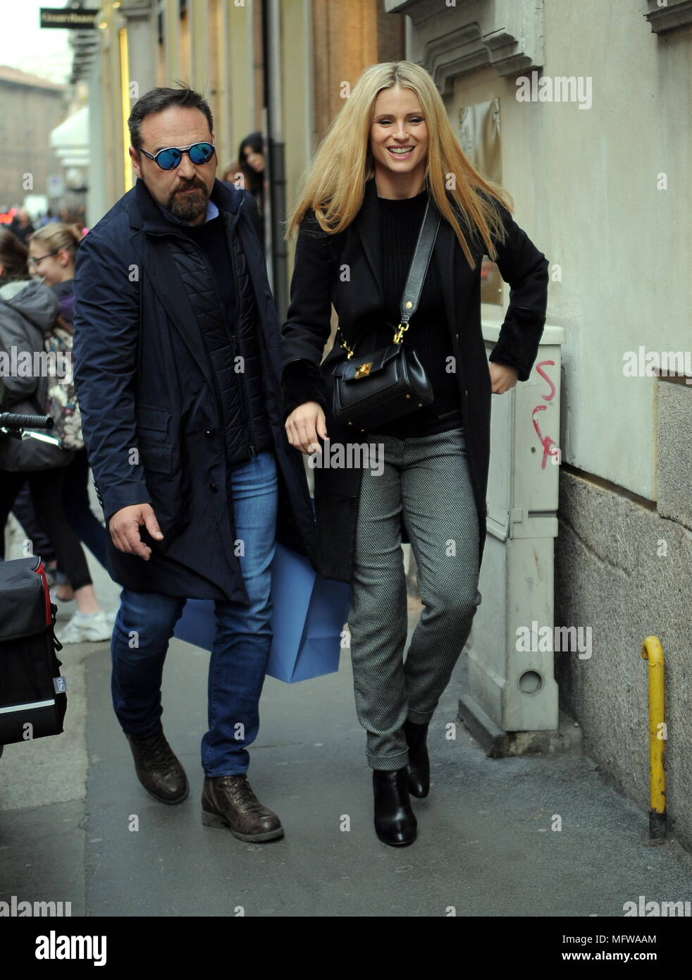 Michelle Hunziker shops at Banner in downtown Milan, Italy. Featuring ...