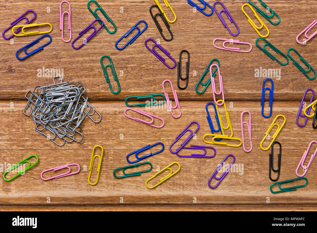 The concept of order and chaos. Chaotic disorganized colorful paper ...