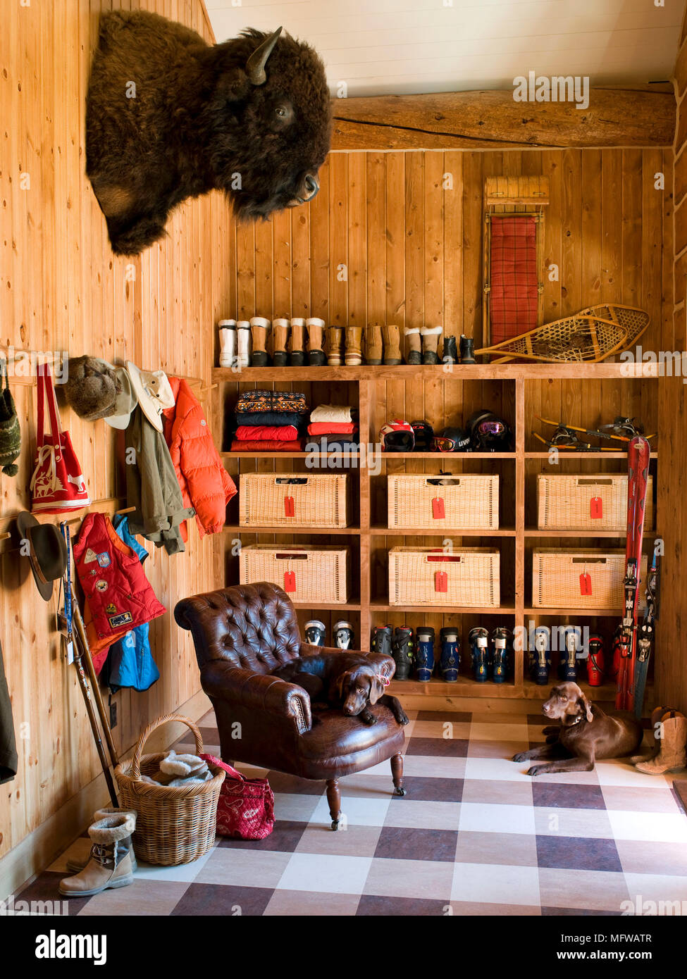 Leather chair in storage room Stock Photo - Alamy