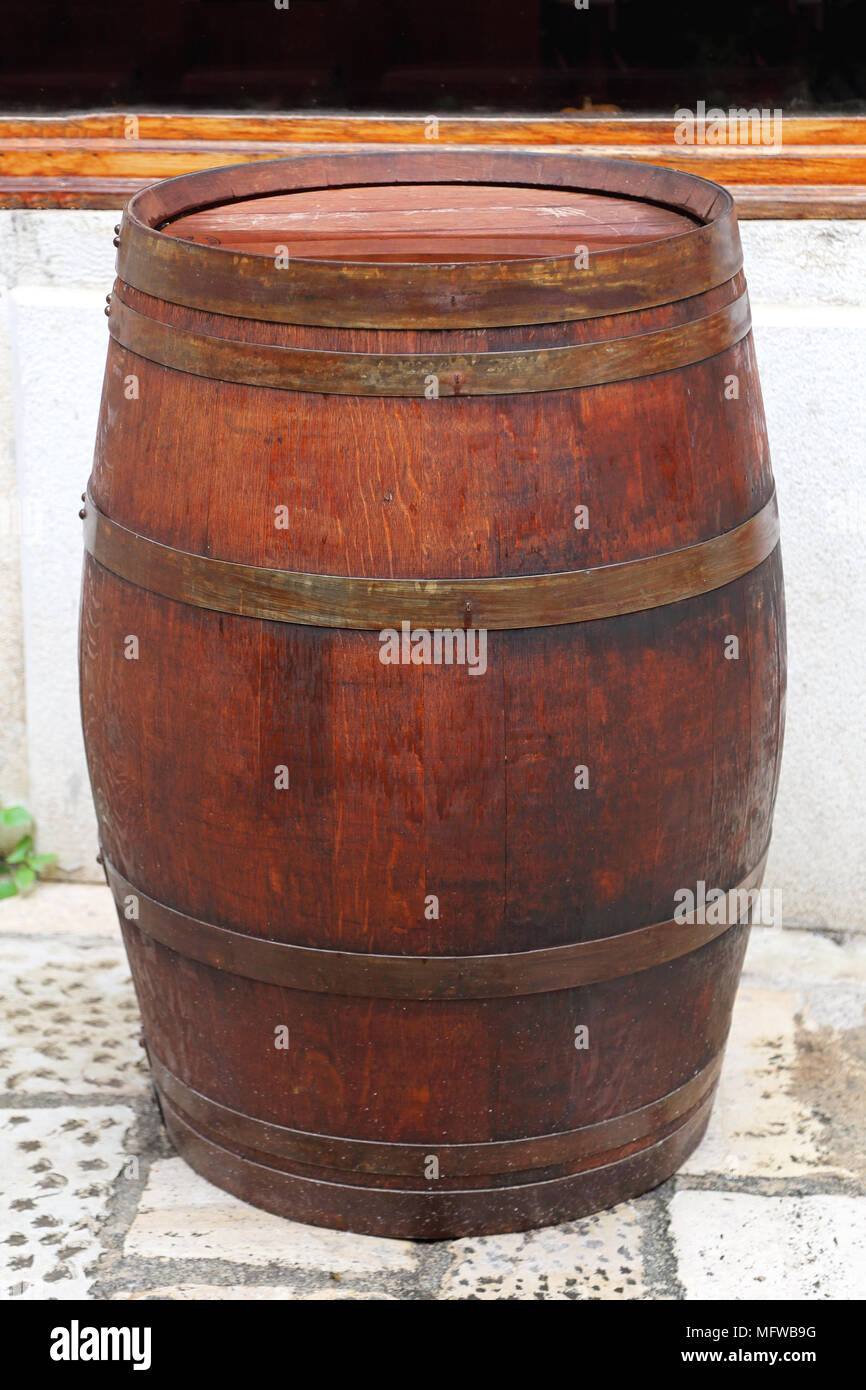 Brown Wooden Barrel in Front of Building Stock Photo - Alamy