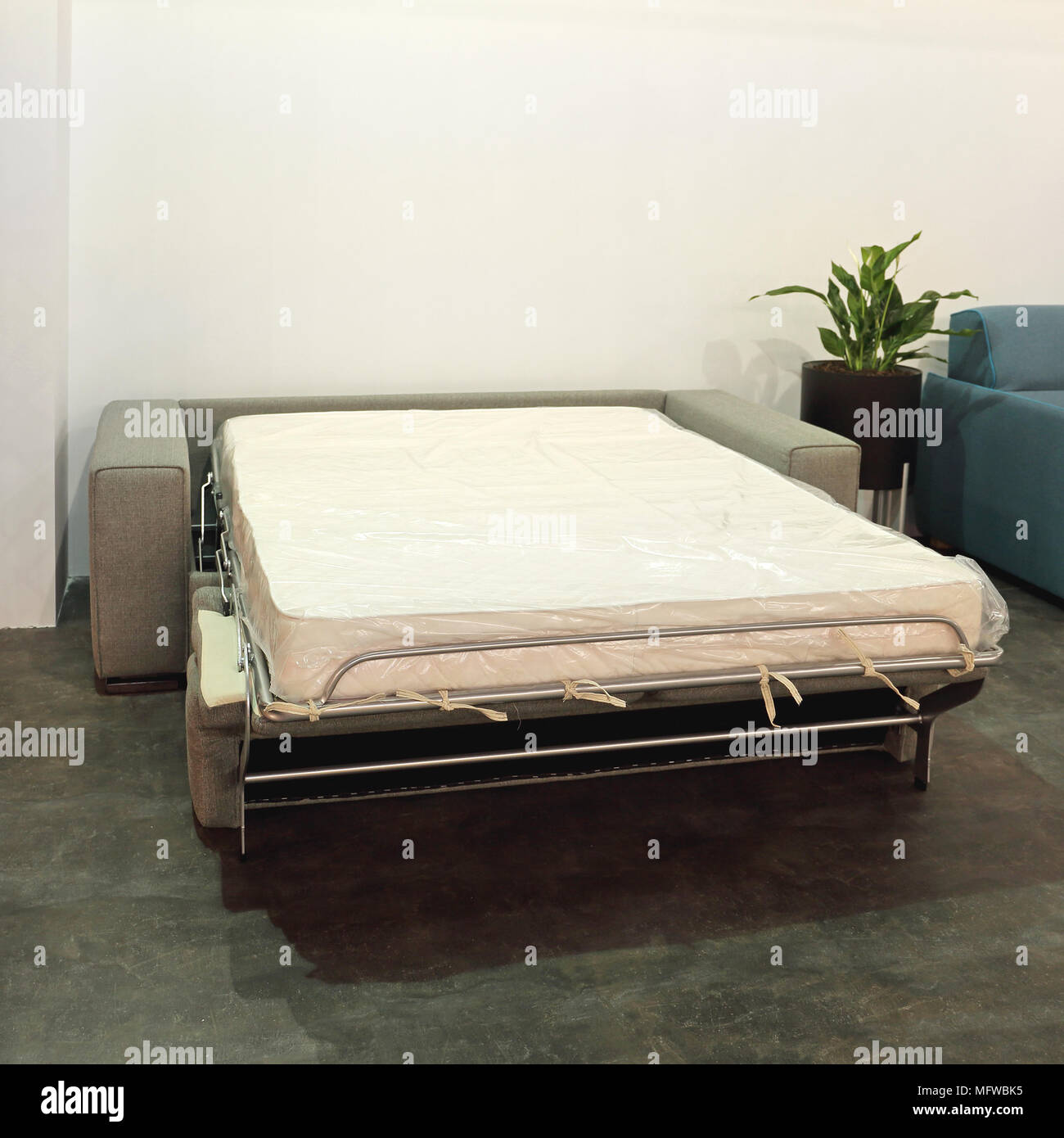 Open Sofa Bed in Living Room Stock Photo - Alamy