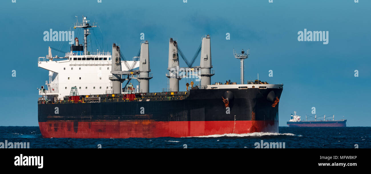 Black bulker ship. Logistics and merchandise transportations Stock ...