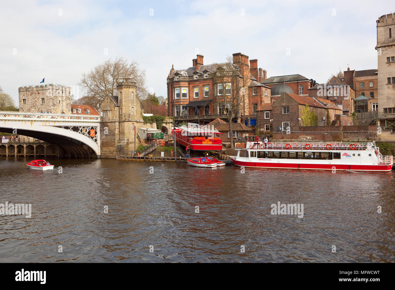 busy river scene by Lendal Bridge in the historical city of York with ...