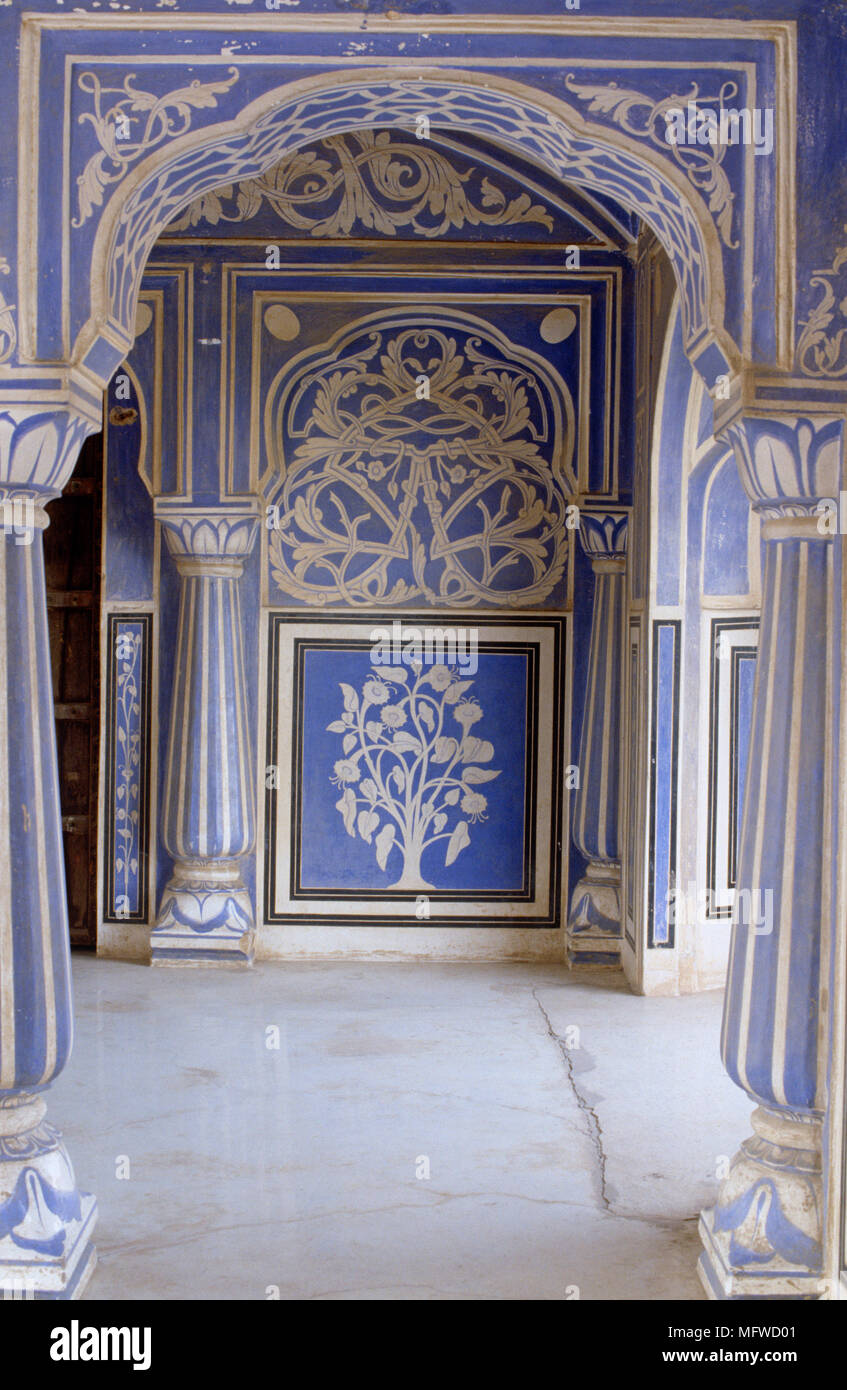 Richly decorated blue hallway with archway and pillars Stock Photo - Alamy