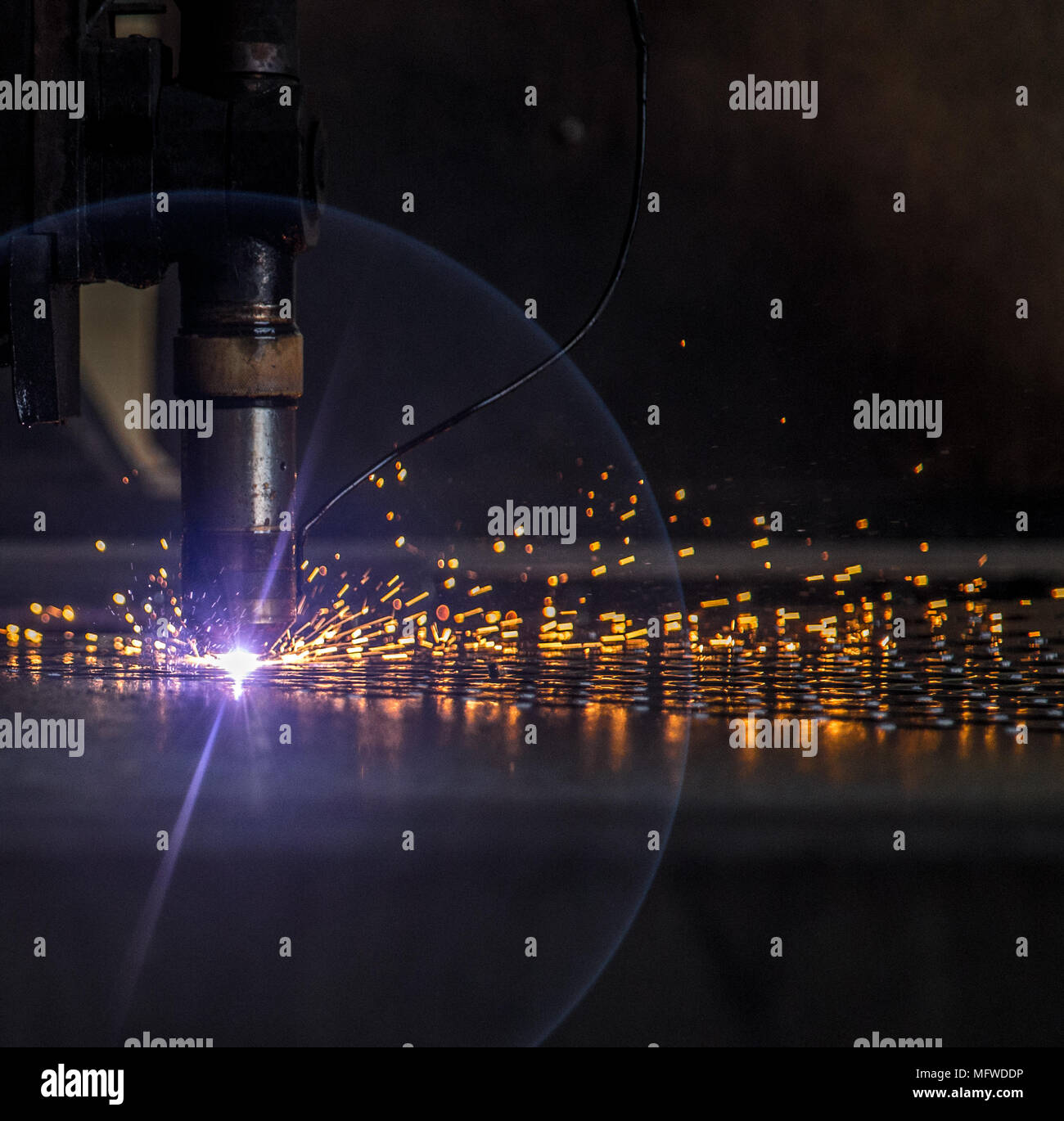 cut plate laser machine cnc spark Stock Photo - Alamy