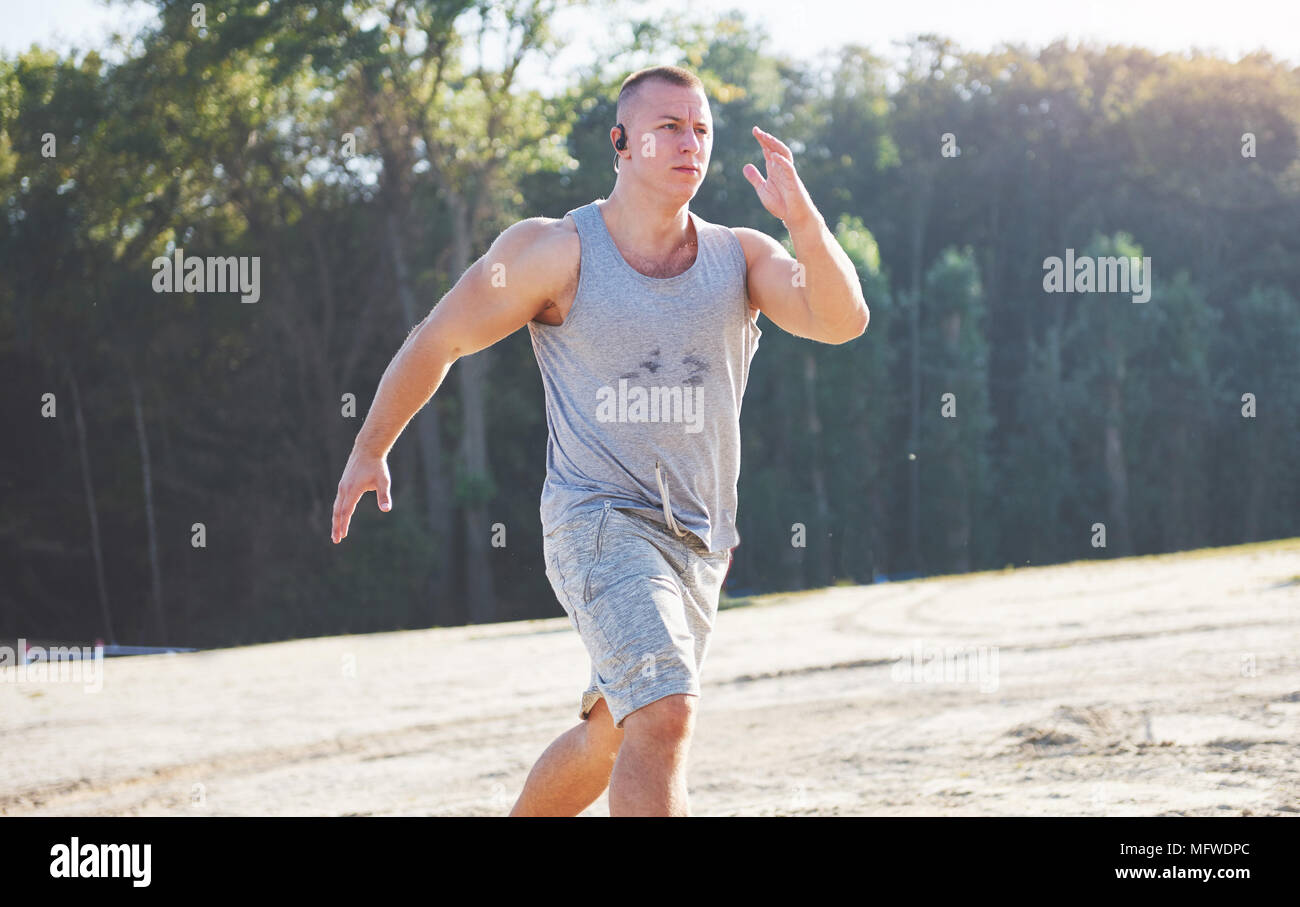 Outdoor cross-country running in early sunrise concept for exercising ...