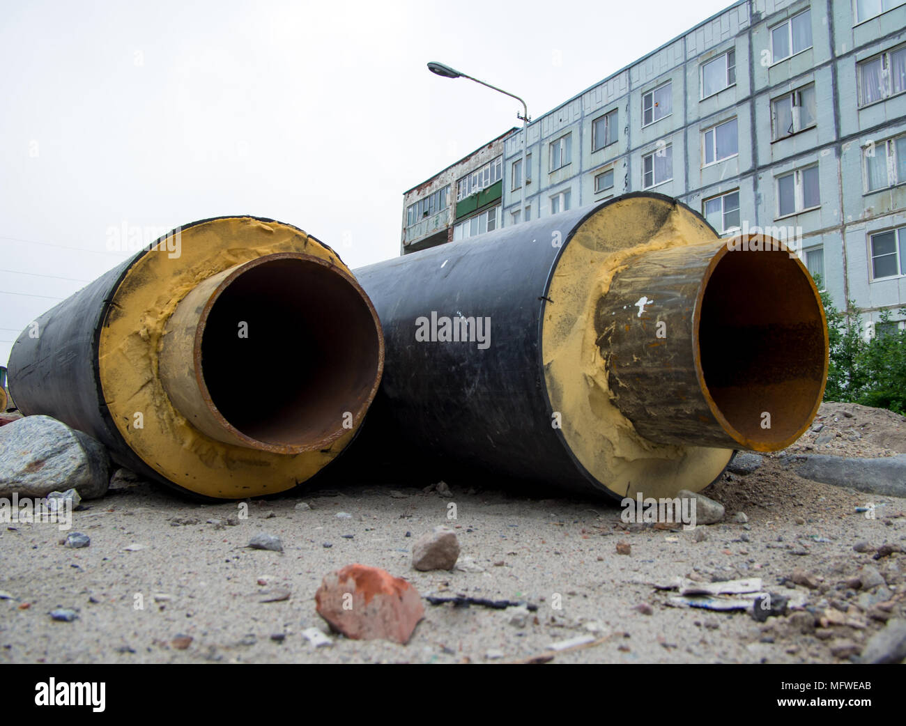 New insulated heating pipes ready for installation Stock Photo - Alamy
