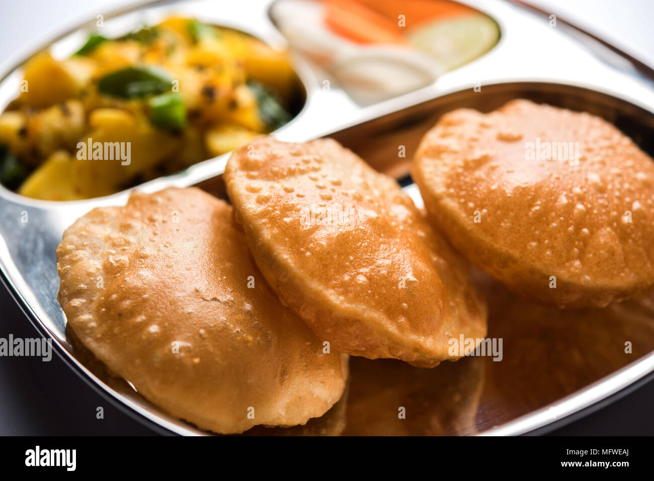 Puri aloo bhaji hi-res stock photography and images - Alamy