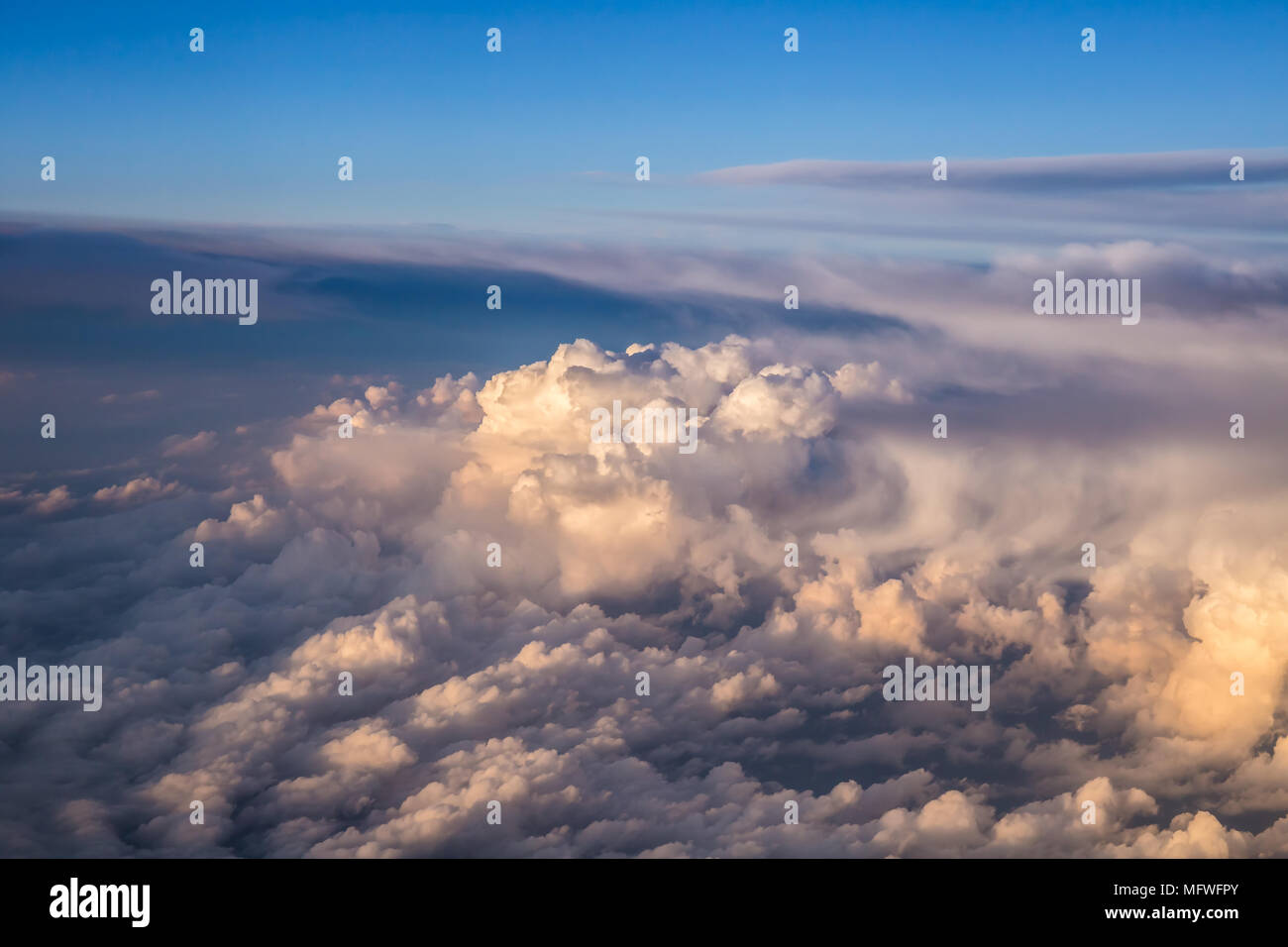 Heaven clouds from airplane seen hi-res stock photography and images ...
