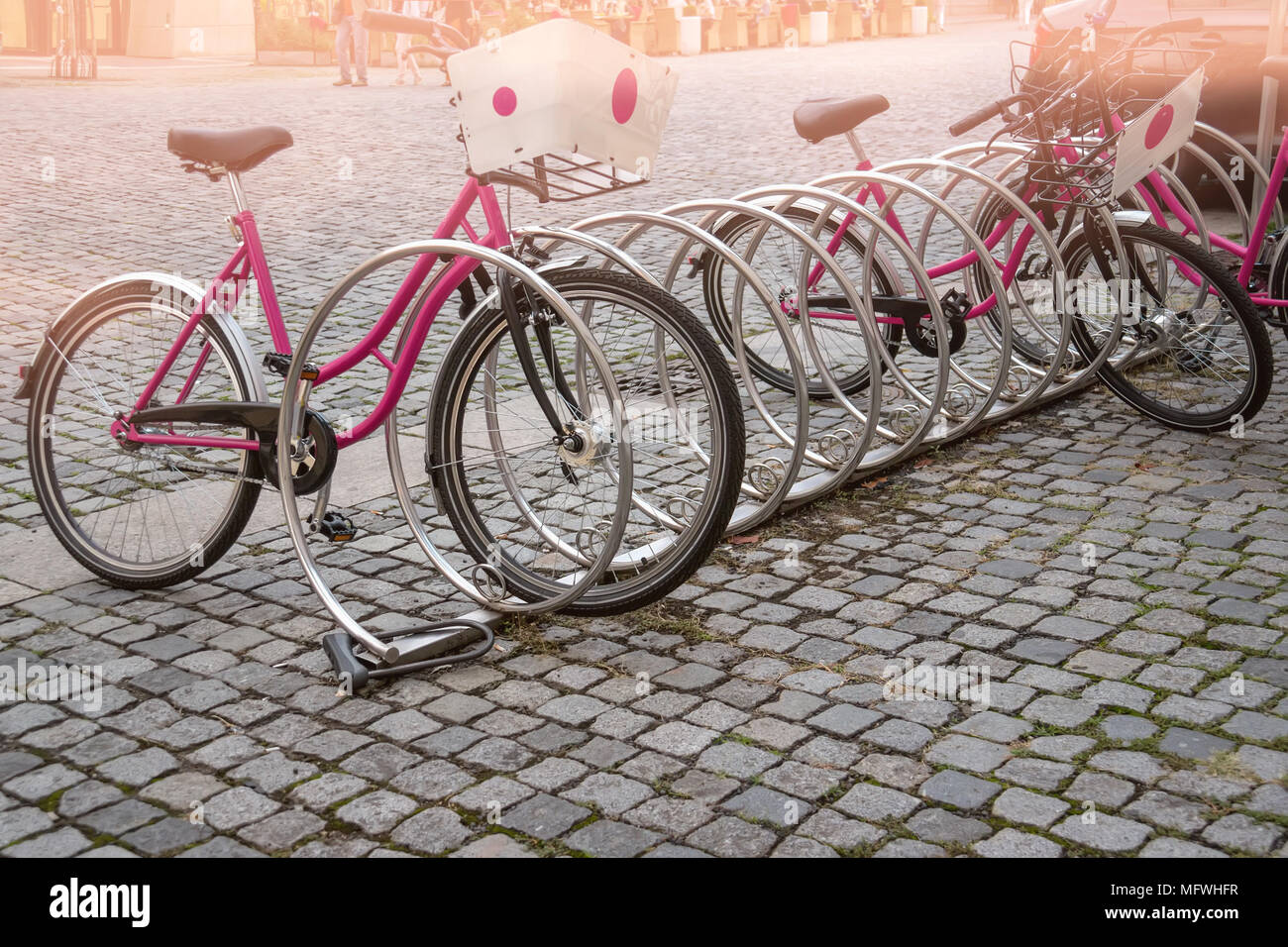 Parking and Bicycle rental in European cities Stock Photo - Alamy