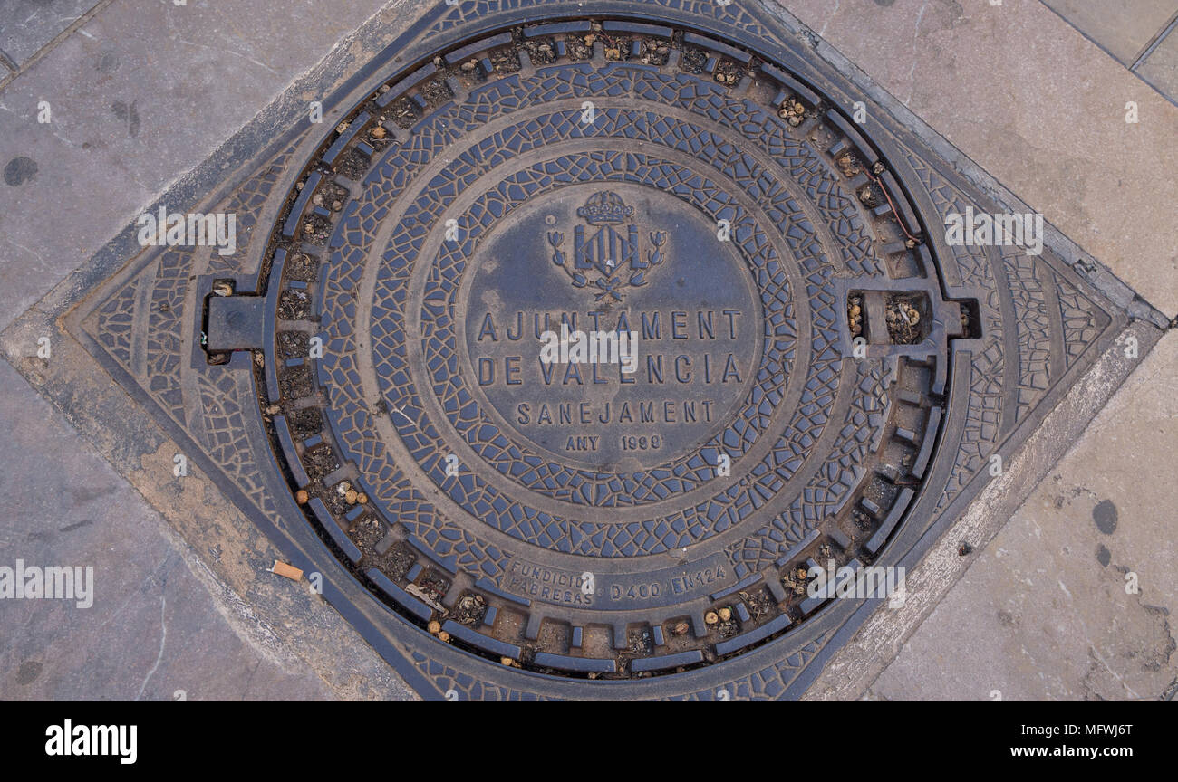 Circular manhole cover in Valencia Spain Stock Photo - Alamy