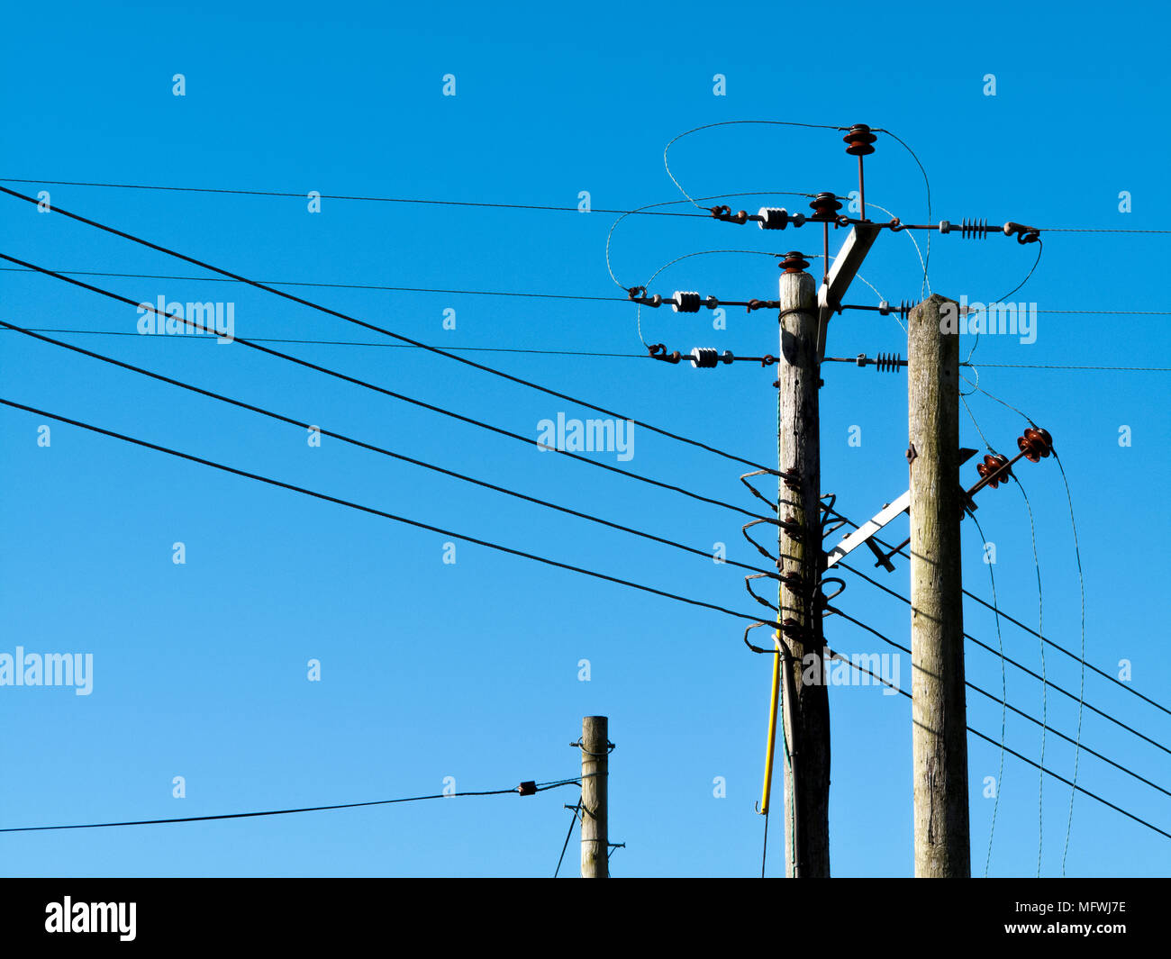 overhead electrical power transmission and distribution cables against ...