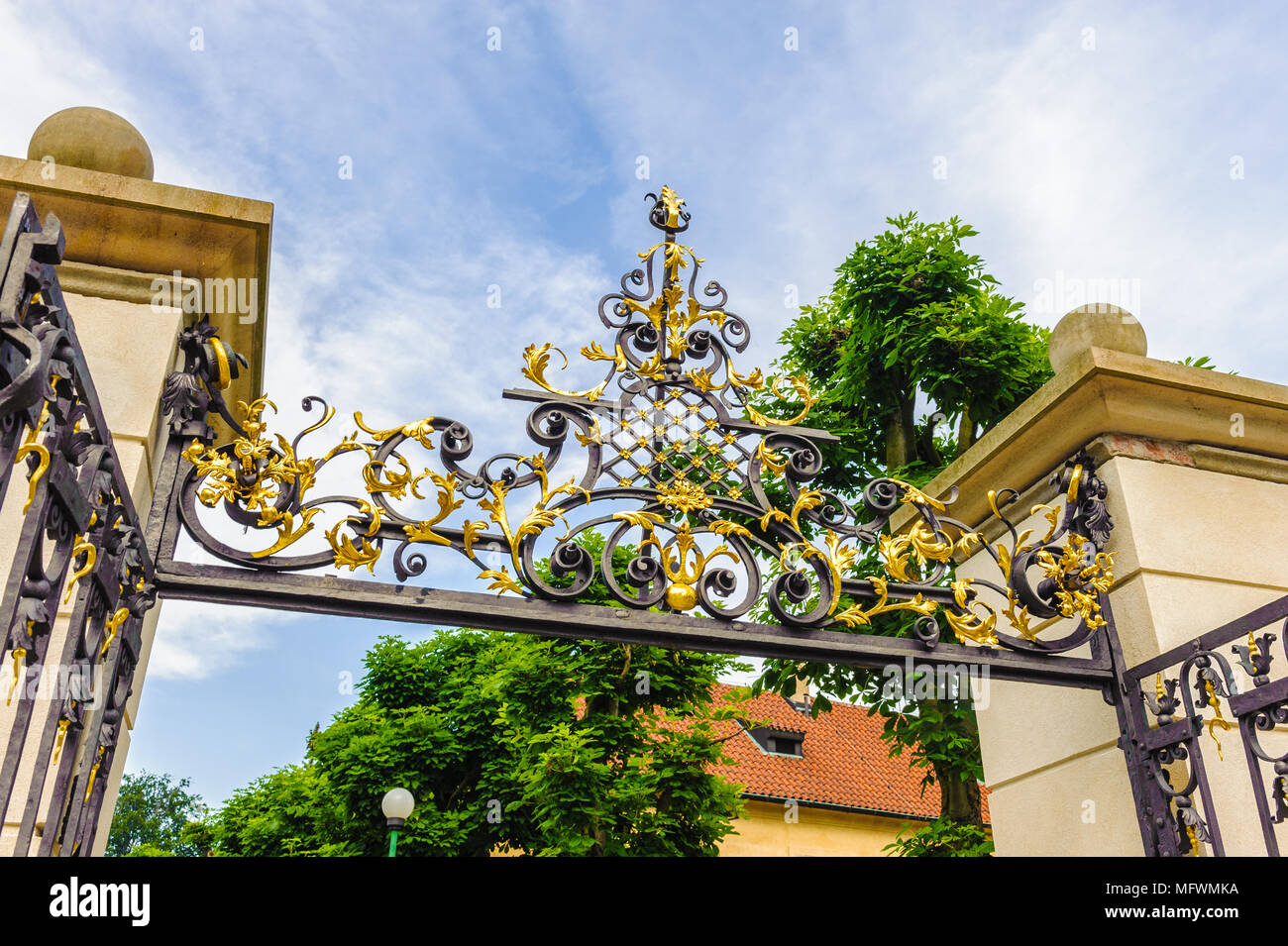 Gate with gold Stock Photo - Alamy