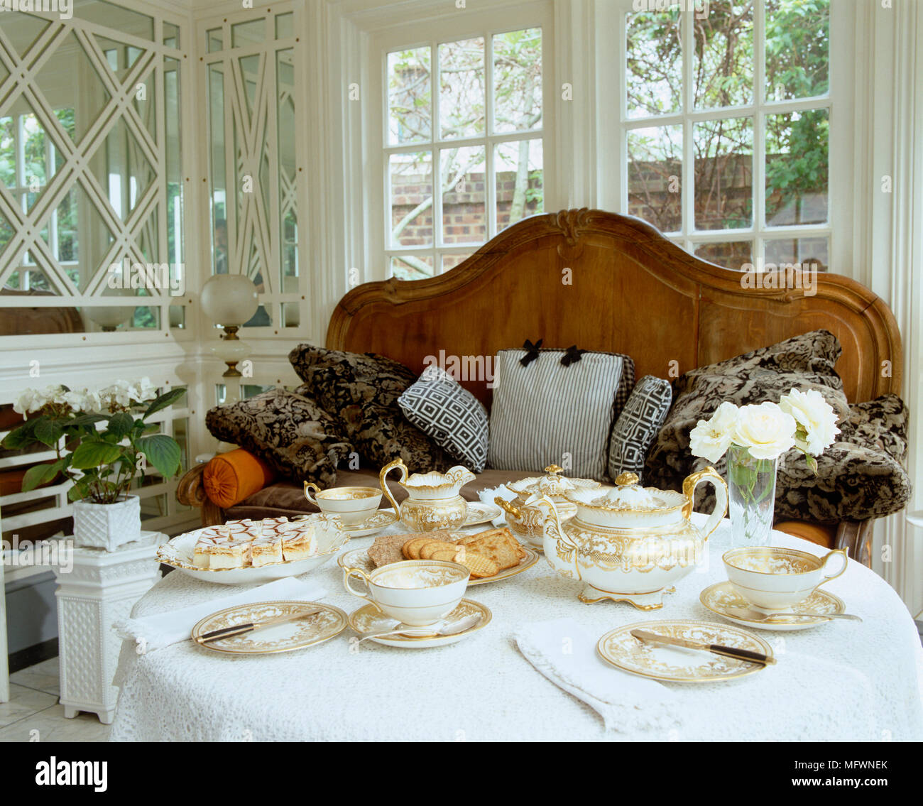 Table set for afternoon tea in traditional style conservatory Stock ...
