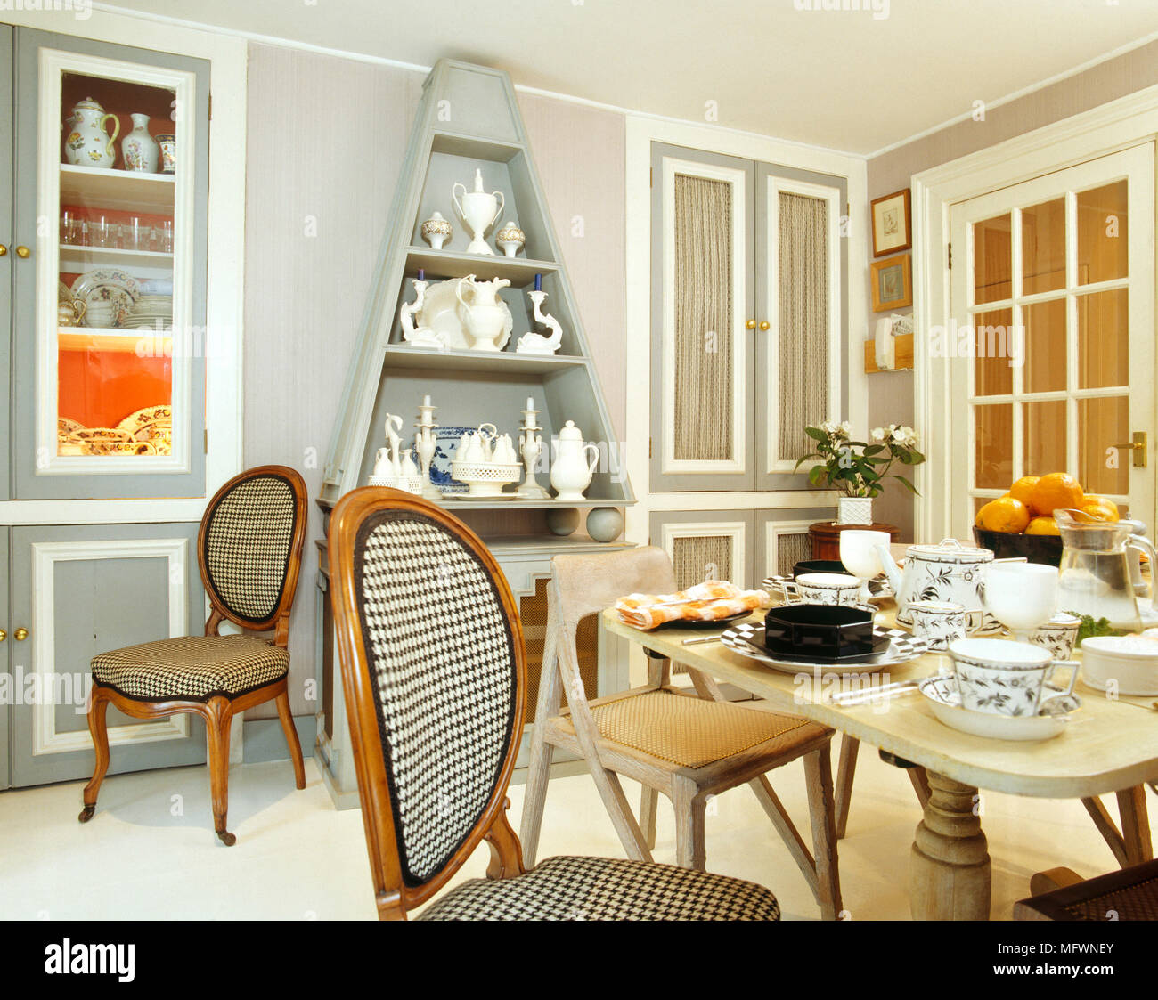 Table set for breakfast in traditional style dining room Stock Photo ...