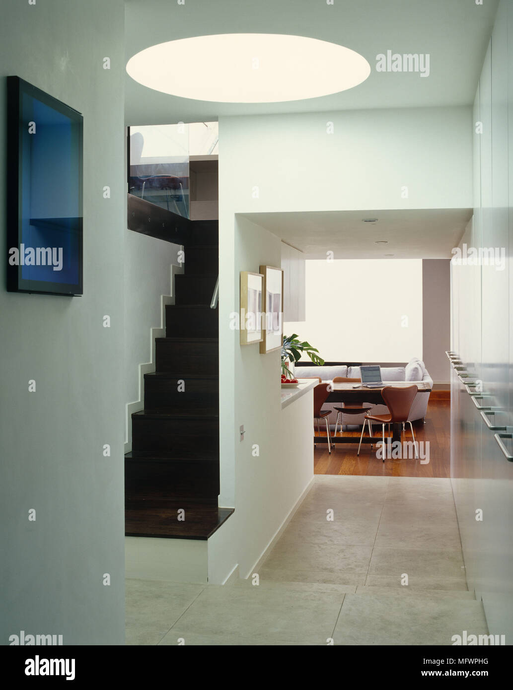 View along hallway to sitting and dining area beyond Stock Photo - Alamy