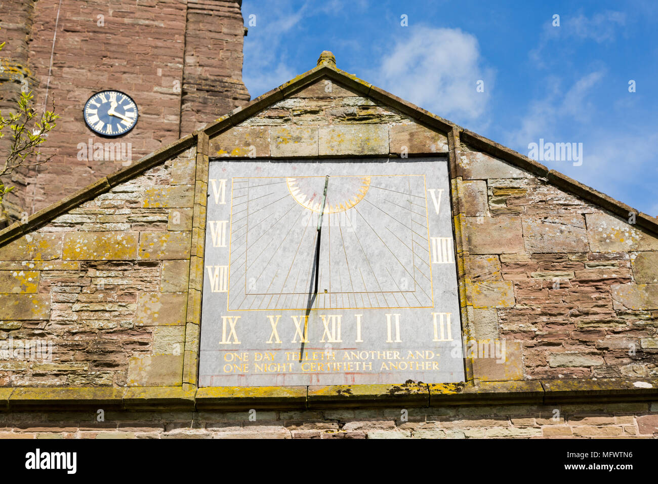 Old fashioned sundial on church wall UK Stock Photo - Alamy
