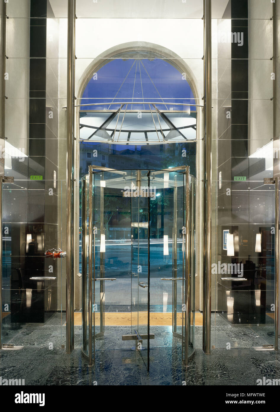 Glass doorway entrance to hotel Stock Photo - Alamy