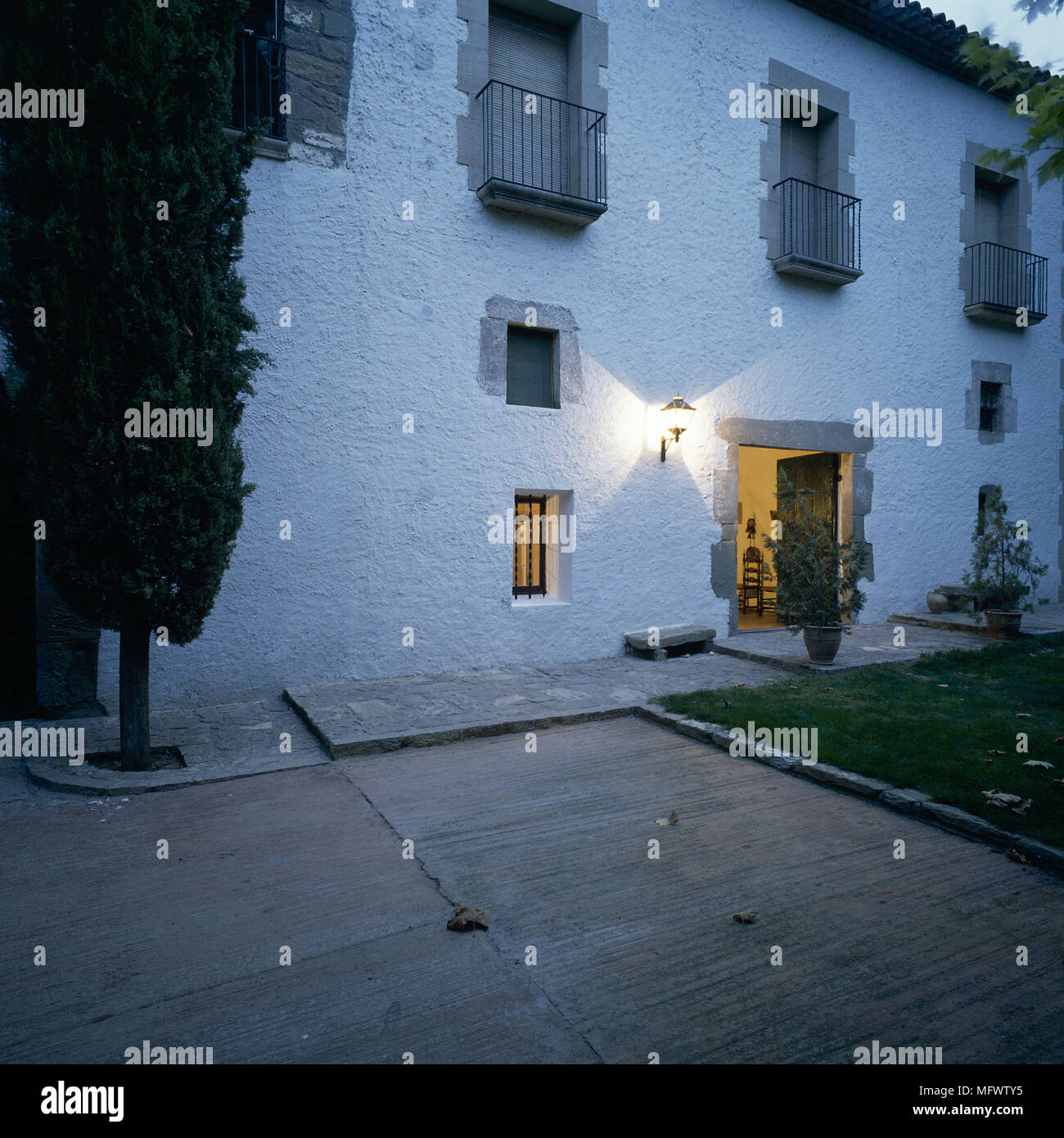 Partial view of a building from a pavement Stock Photo - Alamy