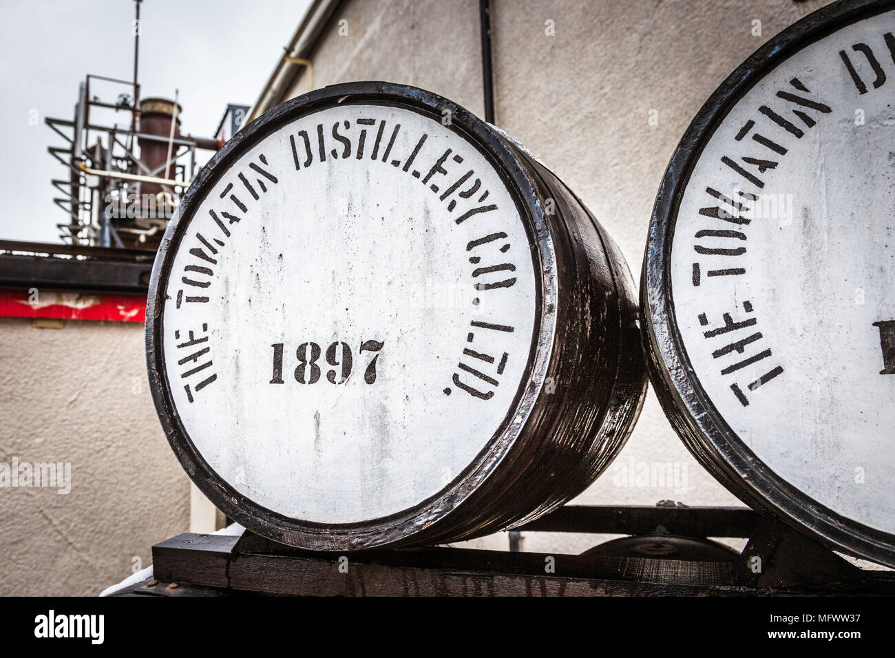 Whisky barrels outside the Tomatin whisky distillery Scotland UK Stock ...