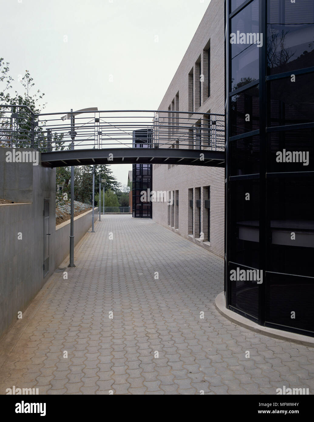 View of a bridge outside an office building Stock Photo - Alamy