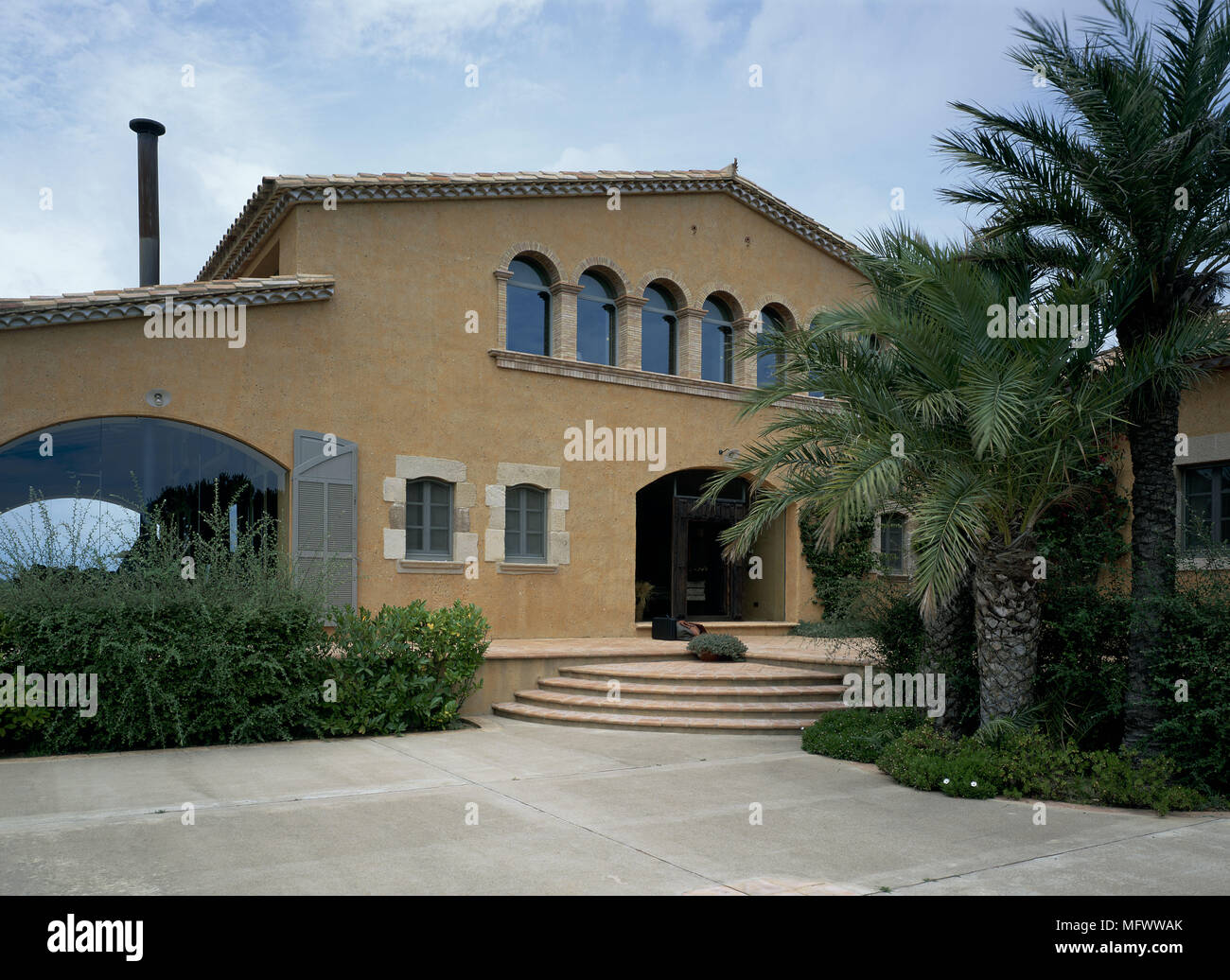 View of a house from a pavement Stock Photo - Alamy