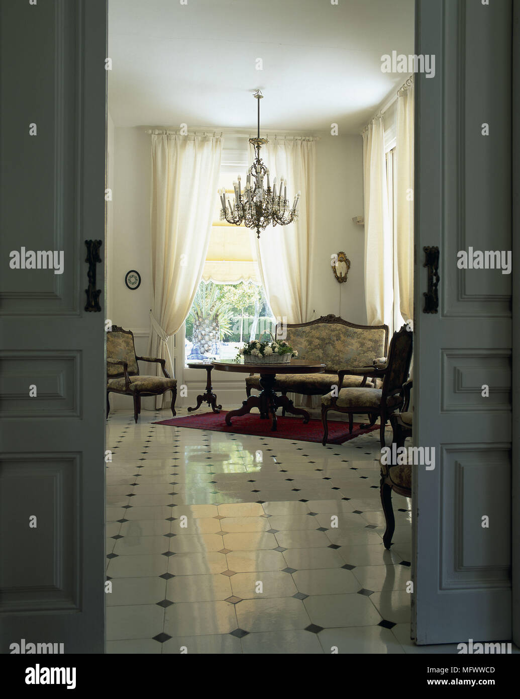 Window chairs through doorway hi-res stock photography and images - Alamy