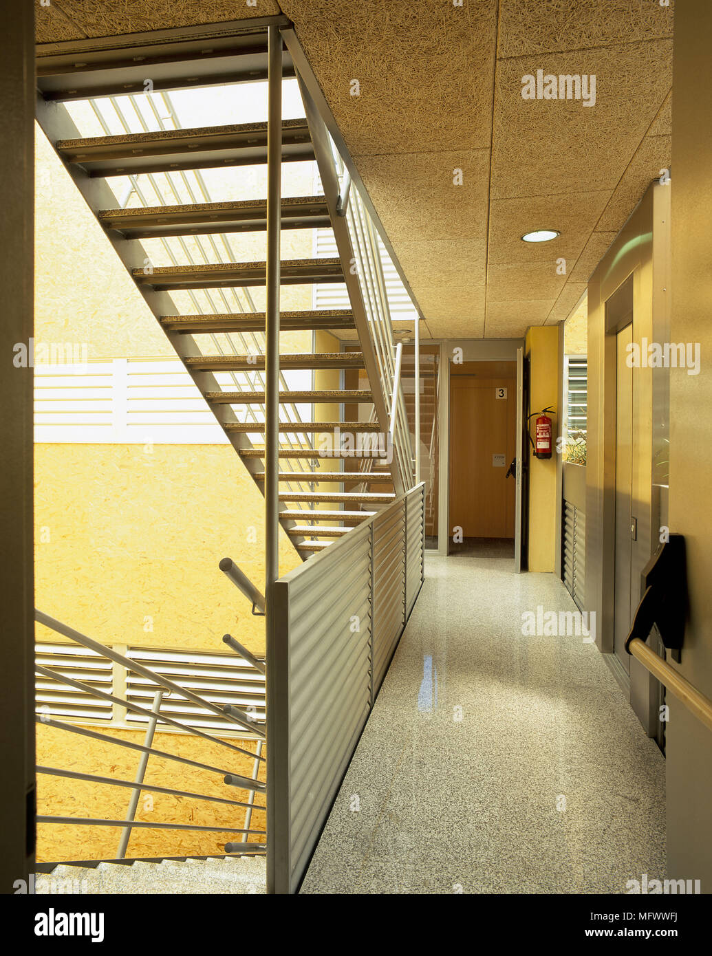 View of a shining hallway inside an office building Stock Photo - Alamy