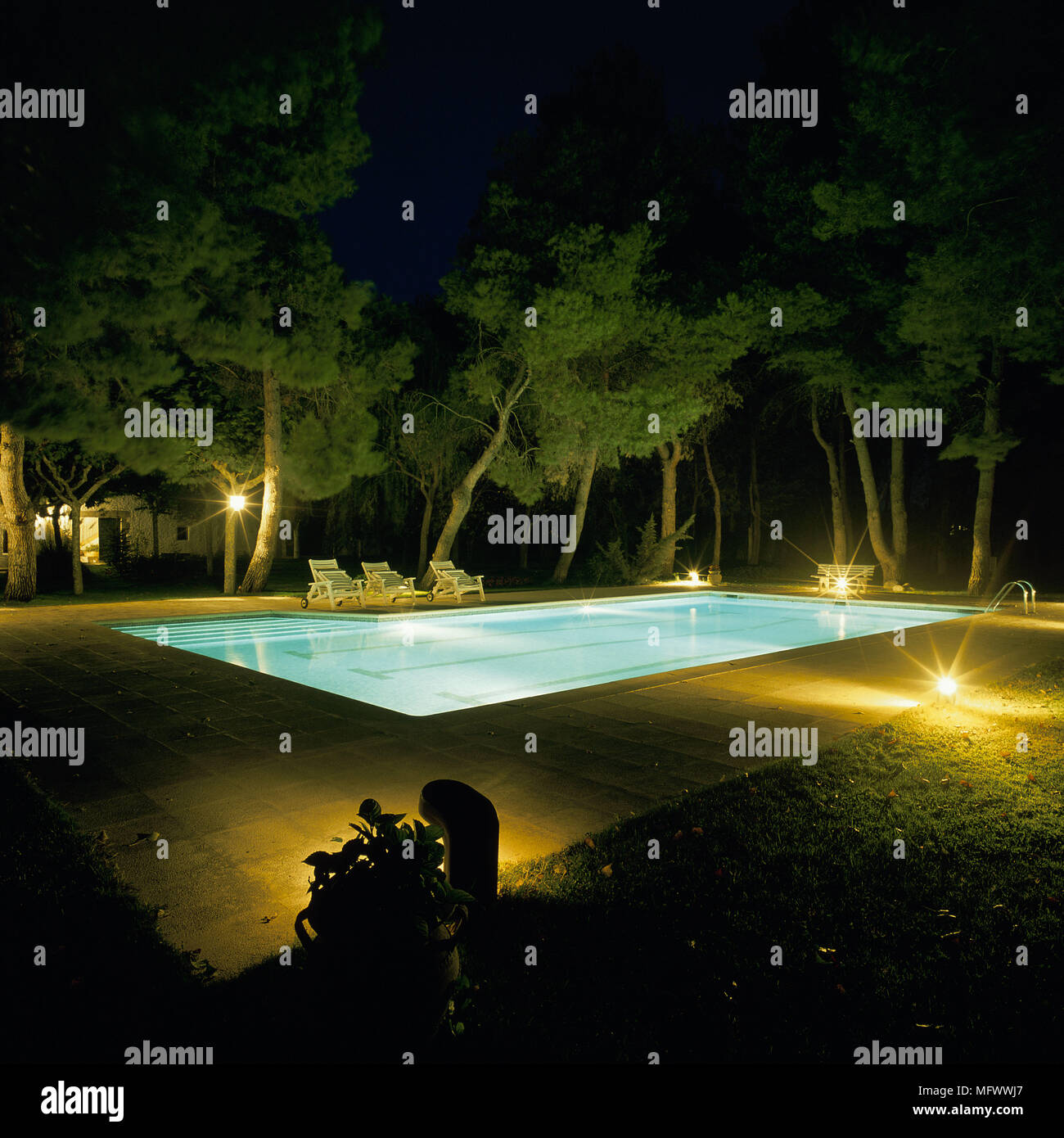View of a swimming pool at night Stock Photo - Alamy