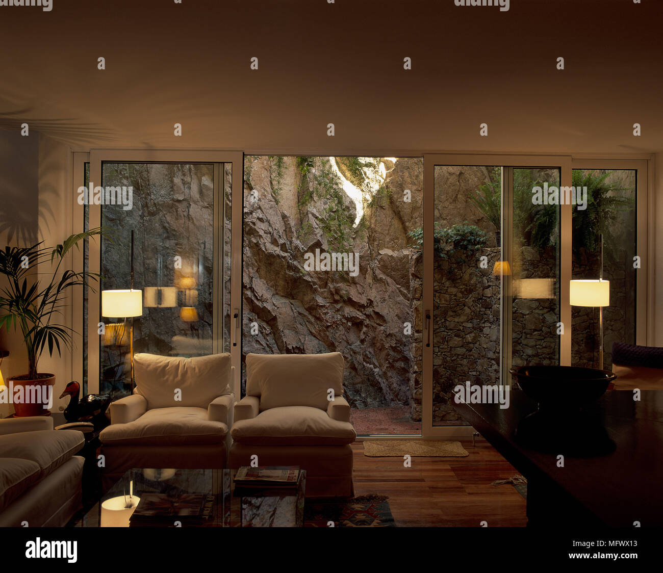 View of an elegant living room with comfortable lounge chairs Stock ...